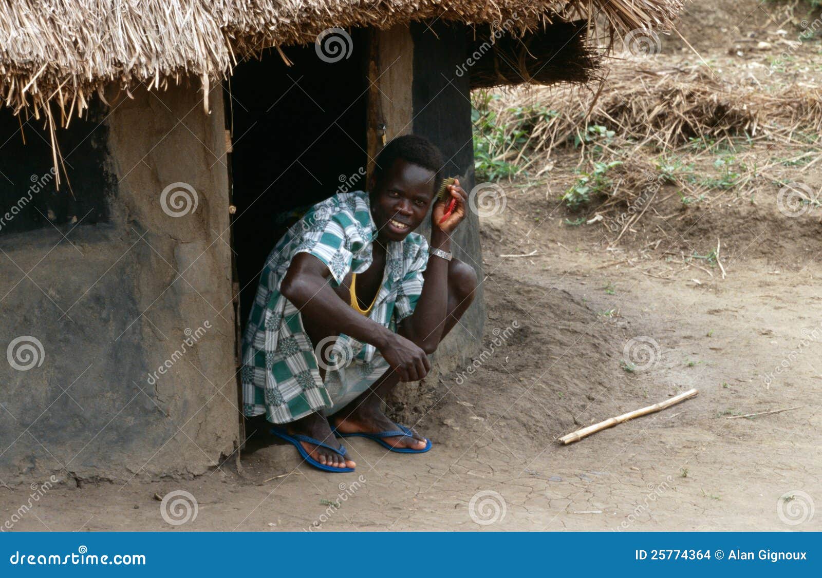 A Villager Outside a Hut, Uganda. Editorial Stock Image - Image of ...