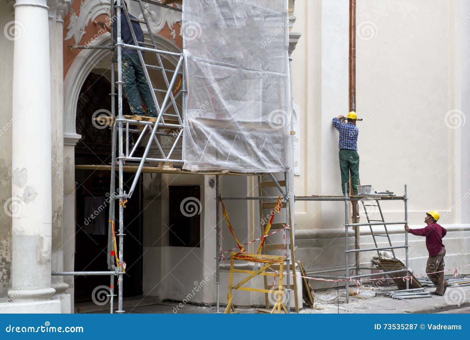 Vilnius, Lithuania - June 20, 2016: Construction Workers in Scaffolding ...