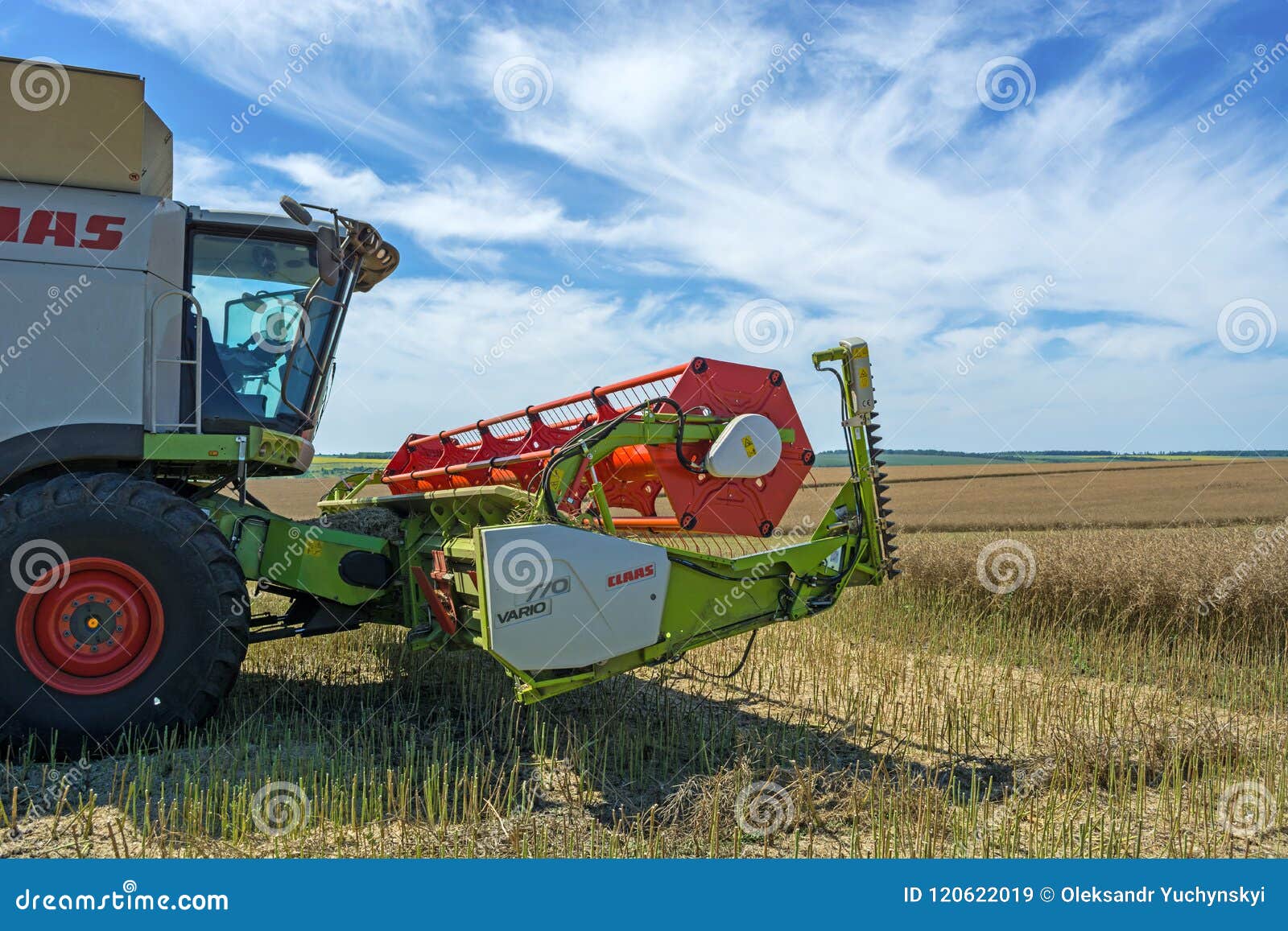 The Process Of Harvesting Rice With A Modern Machine Editorial Image ...