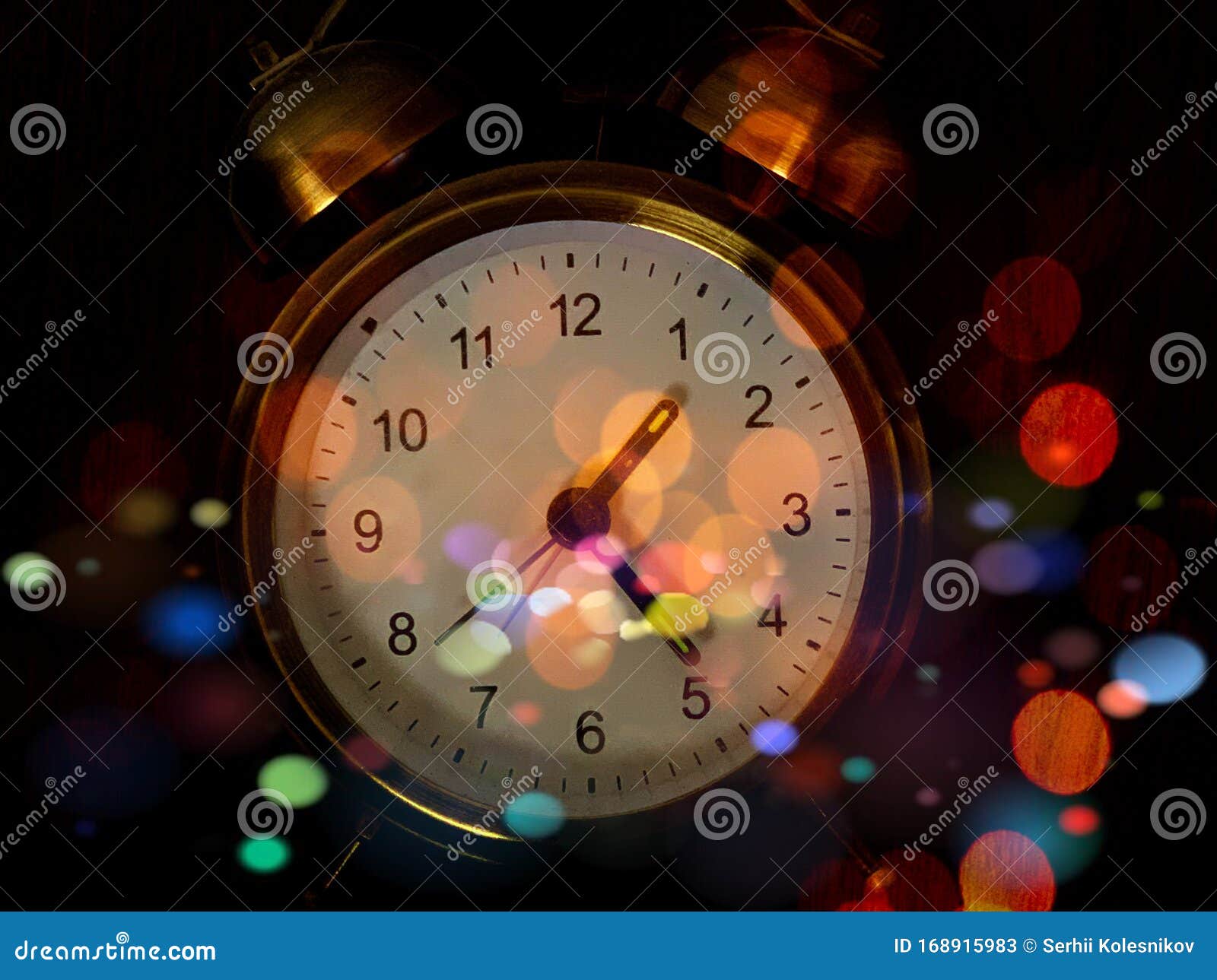 Vintage Alarm Clock on a Dark Background. Round Clock in Multi-colored ...