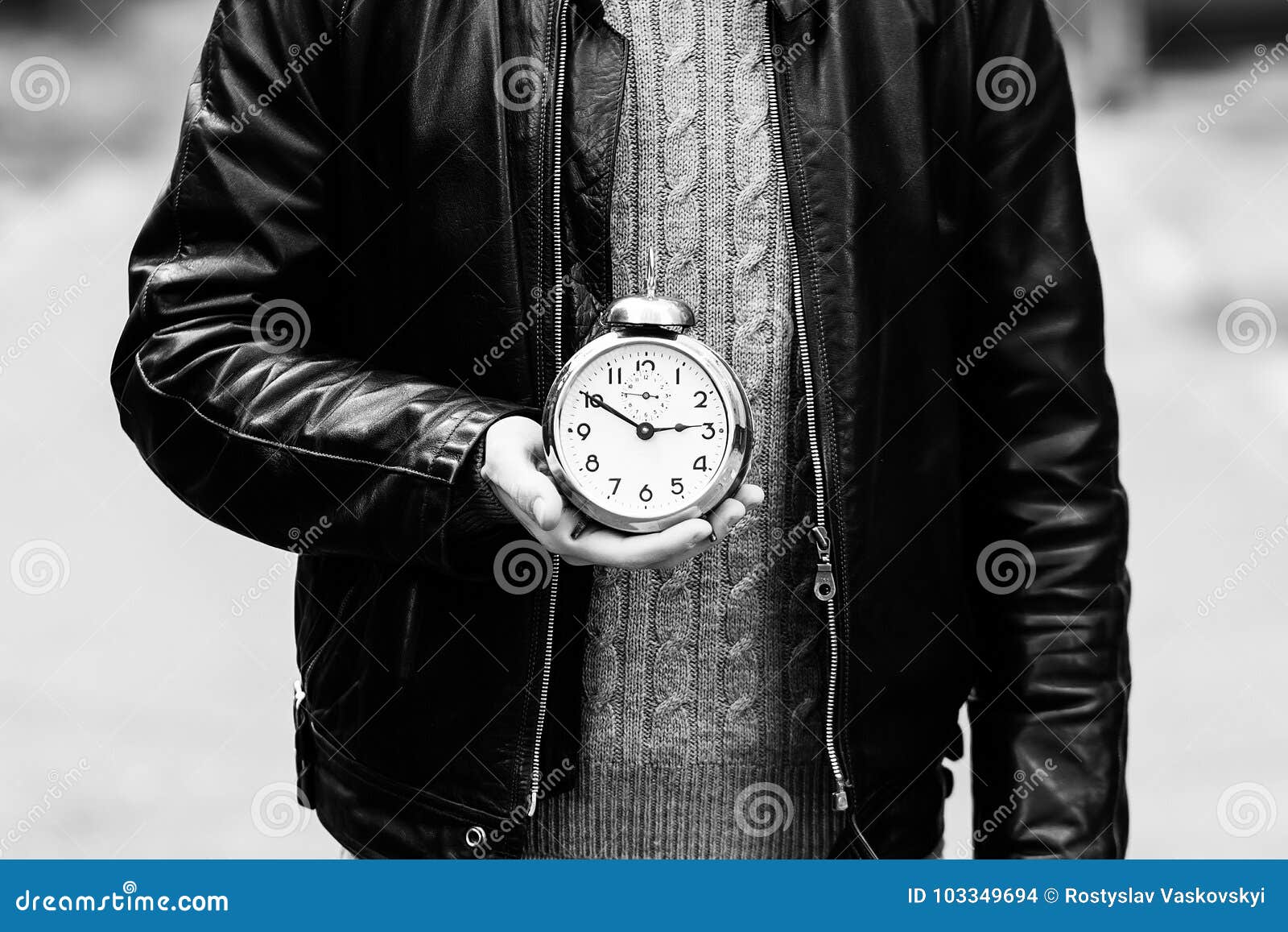 Clock in hand stock photo. Image of black, monochrome - 103349694