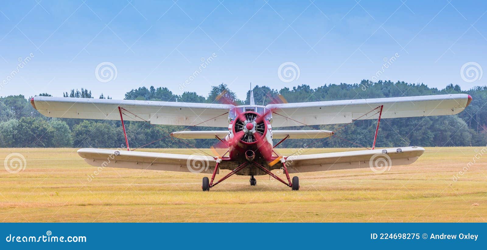 A Vintage Biplane, Engine Running after Landing on an Airfield Stock ...