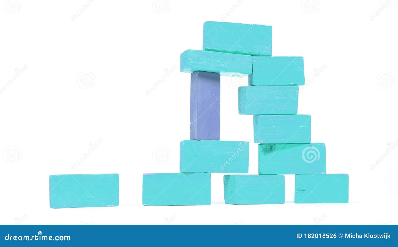 Vintage Blue Building Blocks Isolated on White, One Standing Out Stock ...