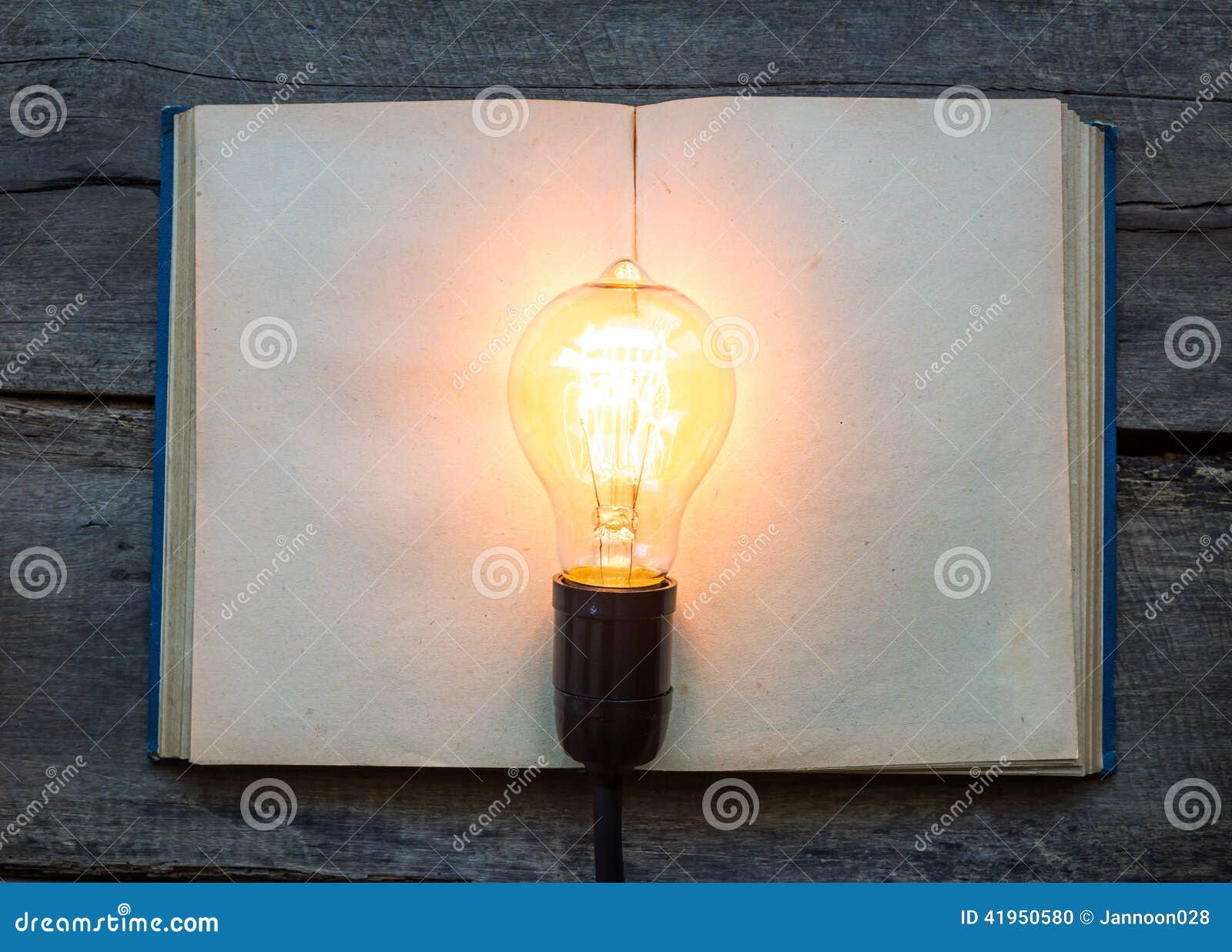 Vintage Book and Light Bulb on Wood Table Stock Photo - Image of open ...