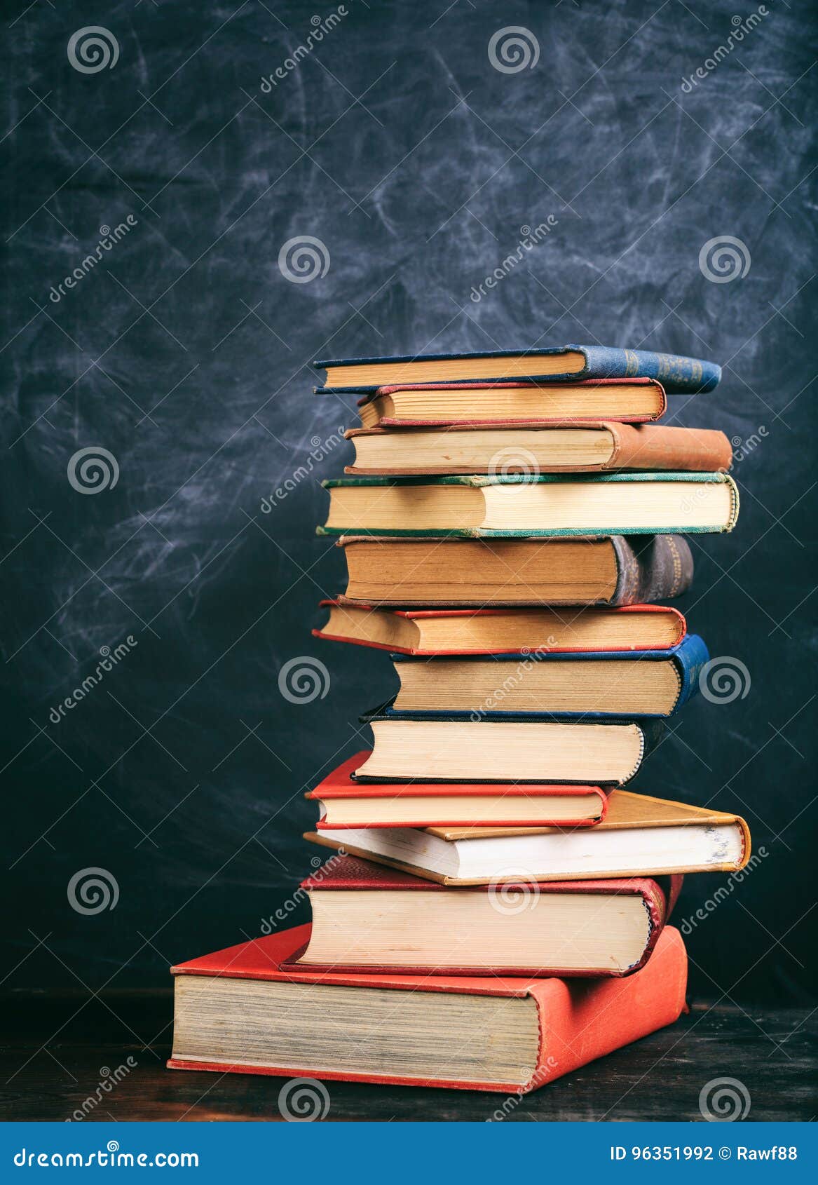 Vintage Books Stack on Blackboard Background Stock Photo - Image of ...
