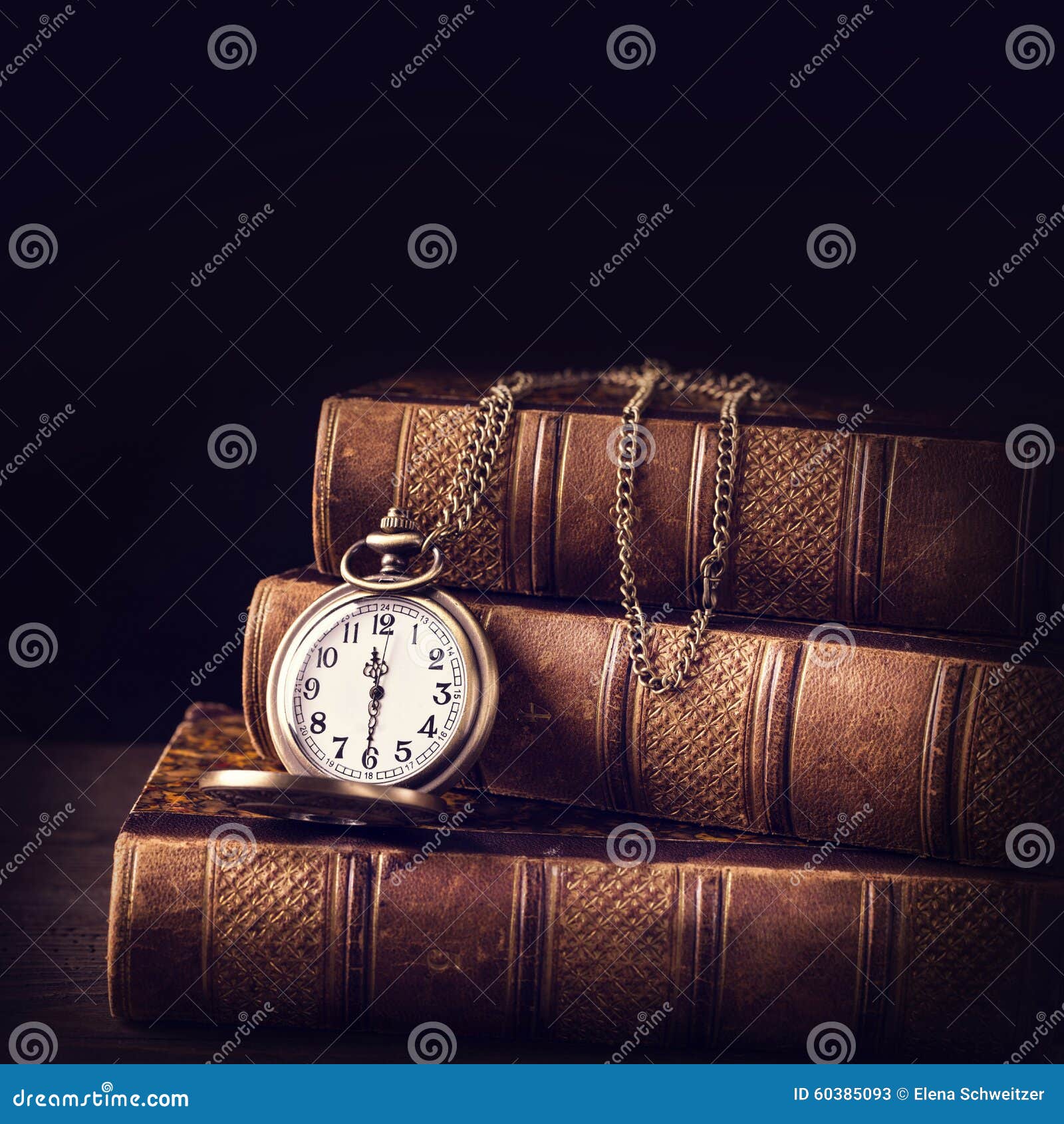 Vintage books and a watch stock image. Image of education - 60385093