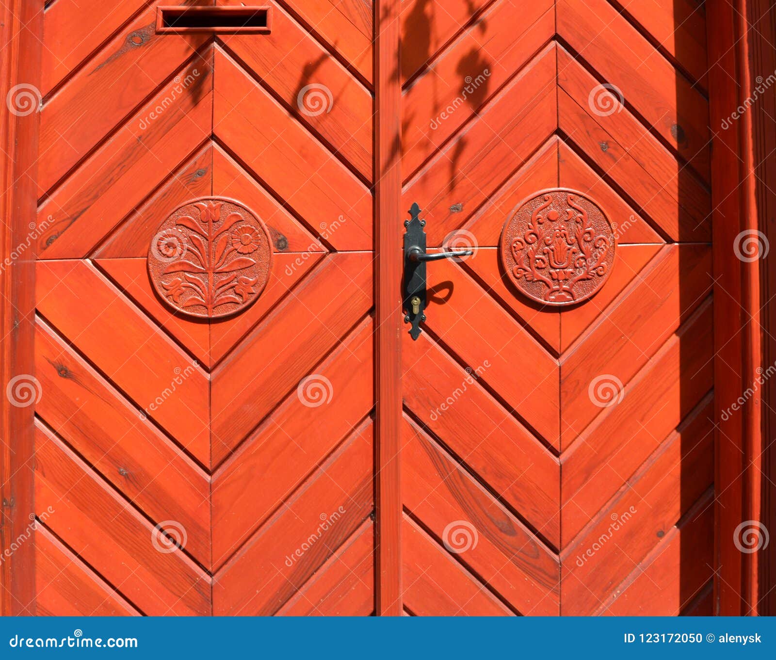 Vintage Bright Orange Wooden Gate with Pattern and Hole for Mail Stock ...