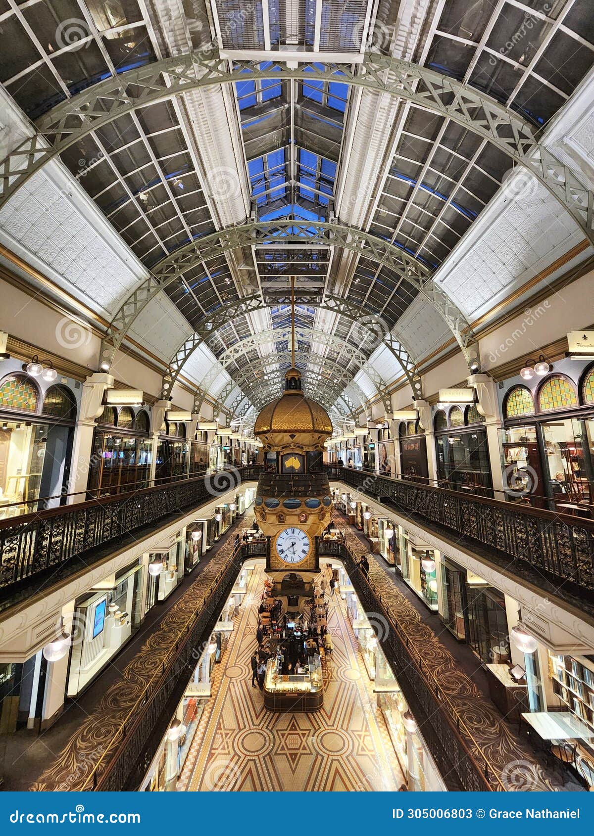 Vintage Clock Hanging from the High Ceiling in Third Floor Editorial ...