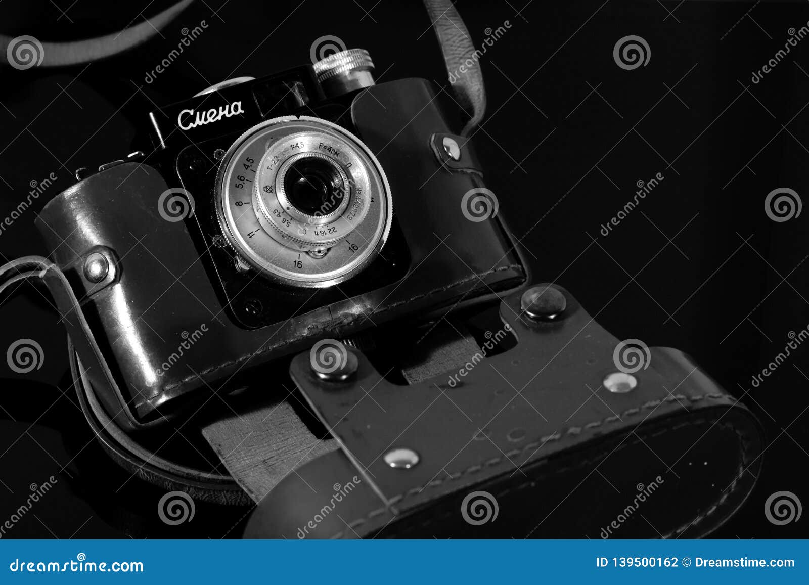 Vintage Camera in the Case on the Mirror Table Editorial Photography ...