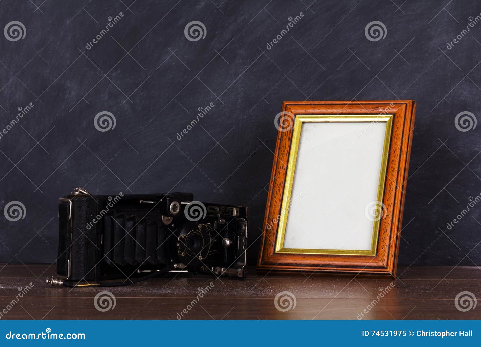 Vintage Camera and Frame Against Blackboard Background Stock Image ...