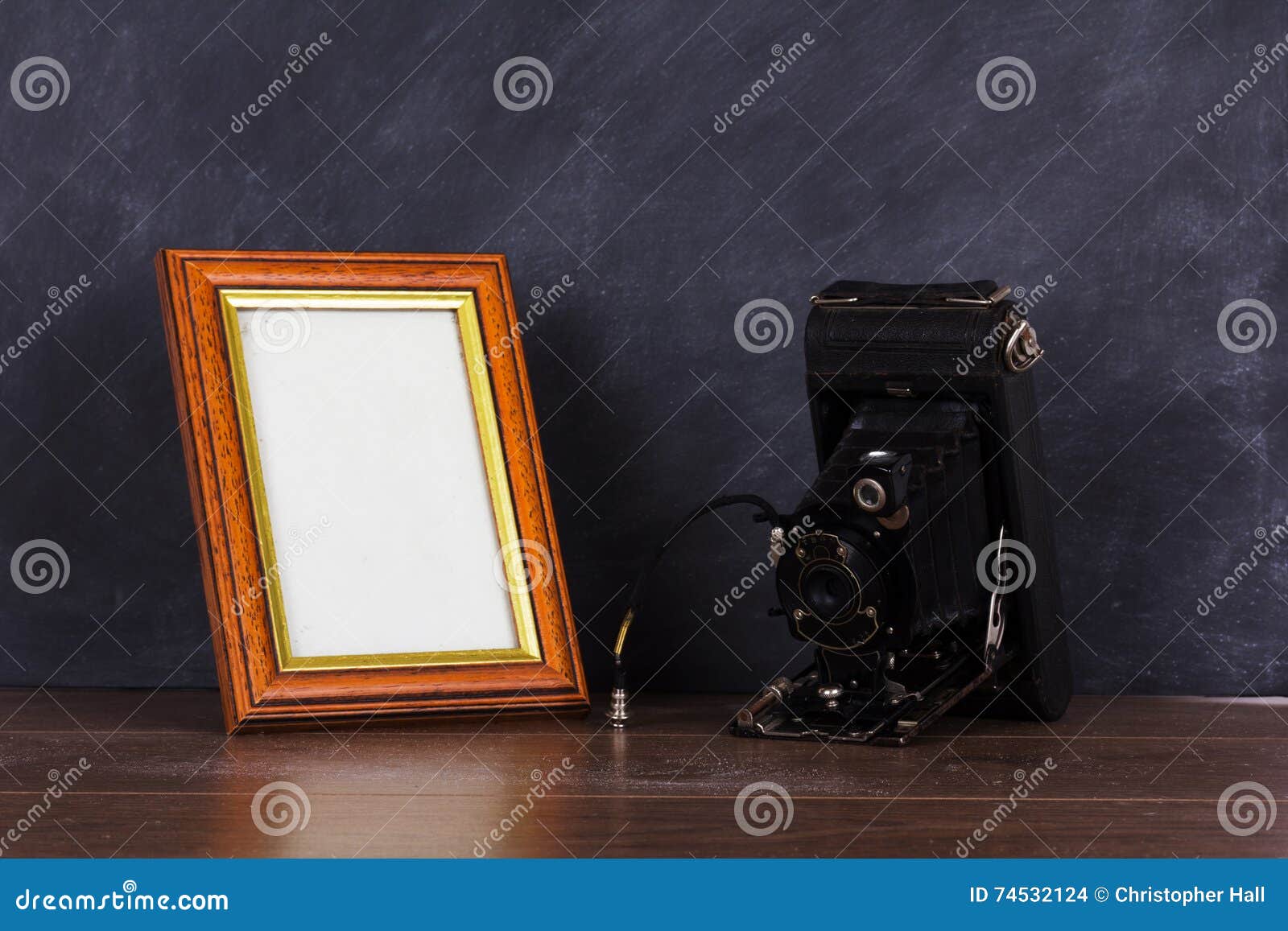 Vintage Camera and Frame Against Blackboard Background Stock Photo ...