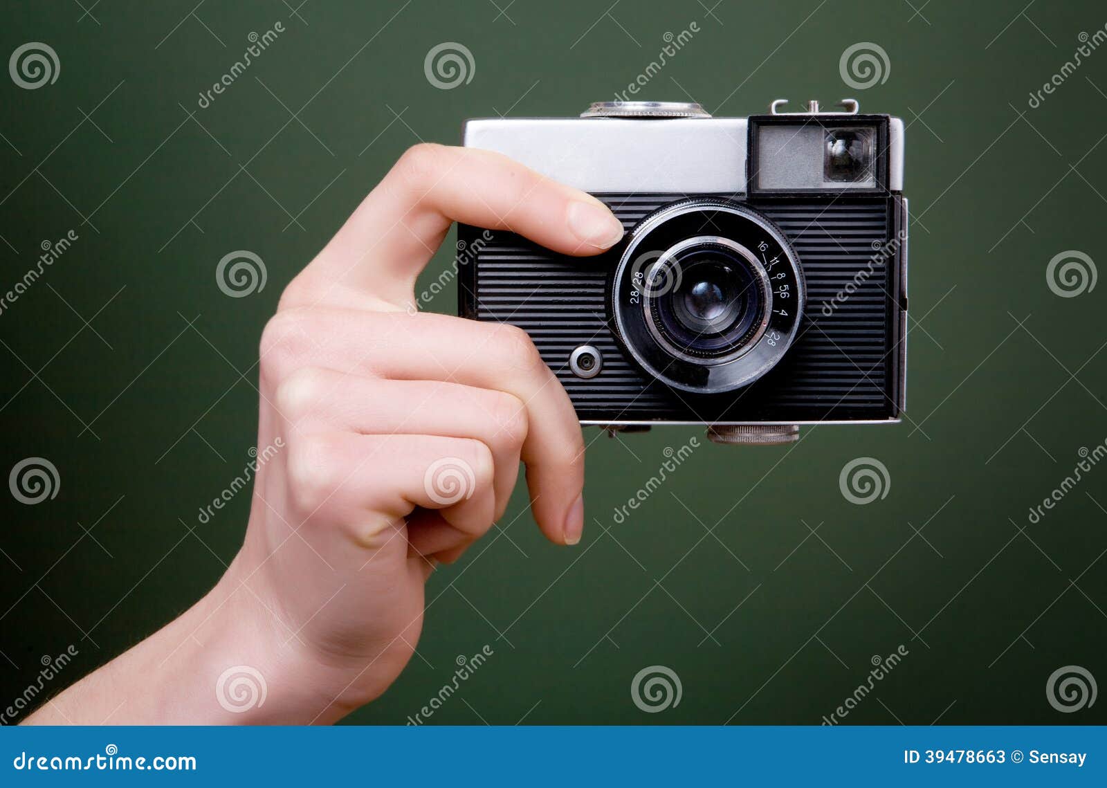 Vintage camera in hand stock image. Image of holding - 39478663