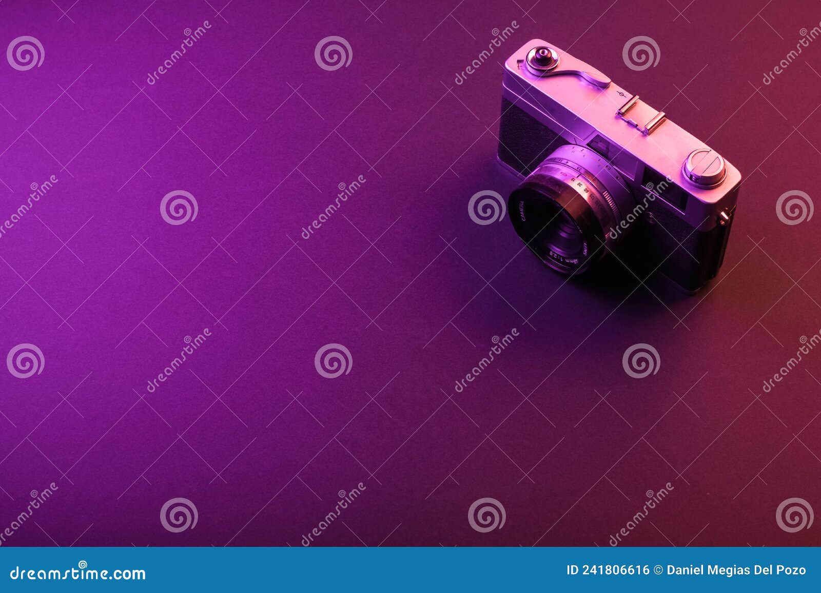Vintage Camera Isolate on Black Background and Purple Light Stock Photo ...