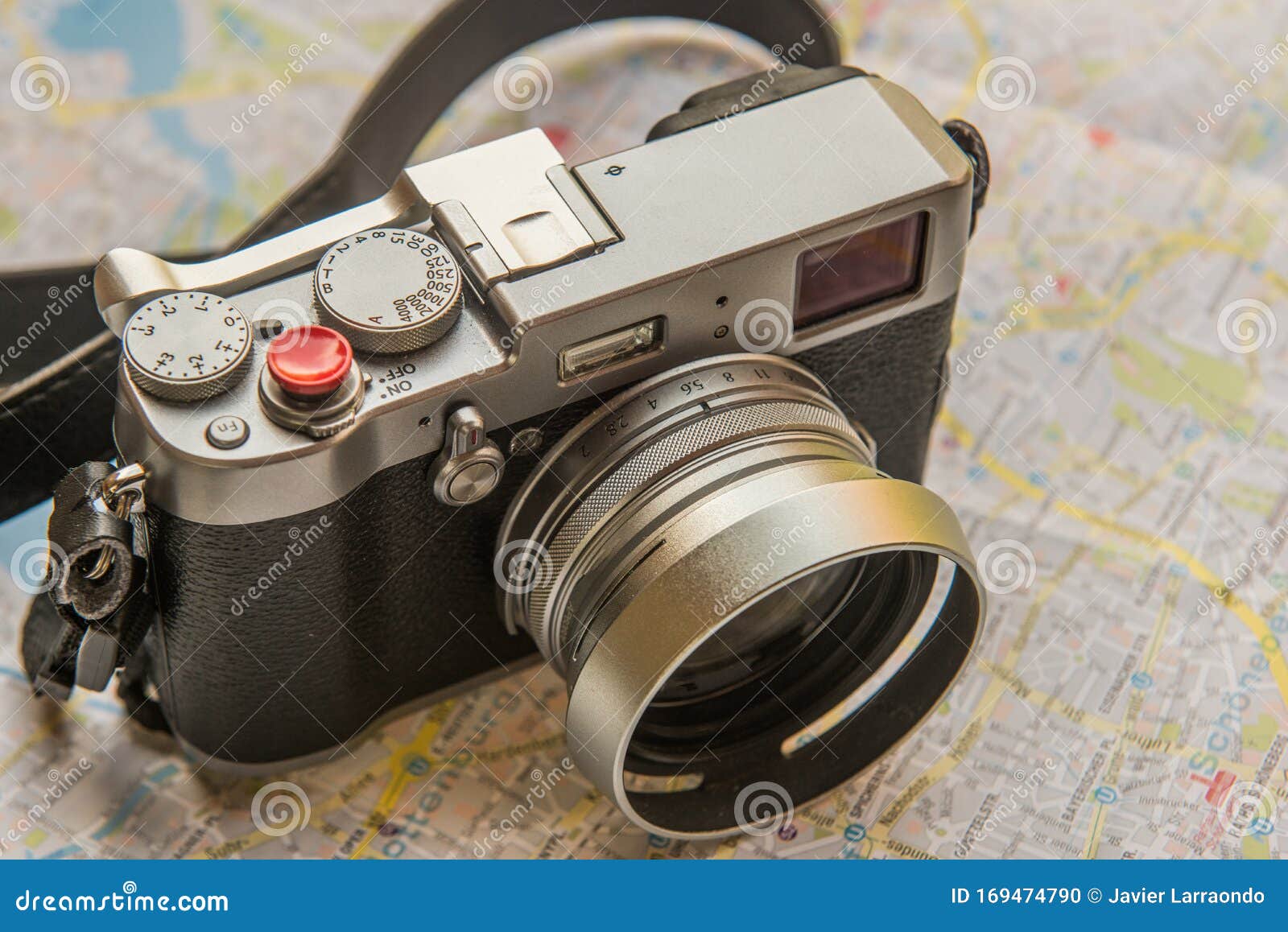 Vintage camera on a map stock photo. Image of discovery - 169474790