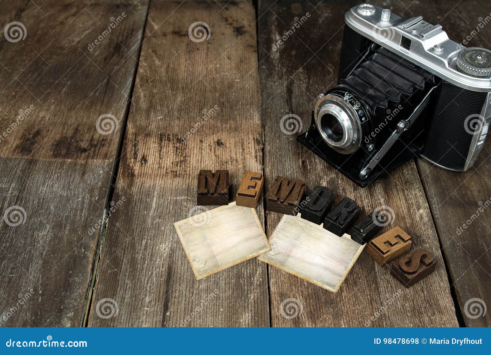 Vintage Camera with Snapshots Stock Photo - Image of camera, vintage ...