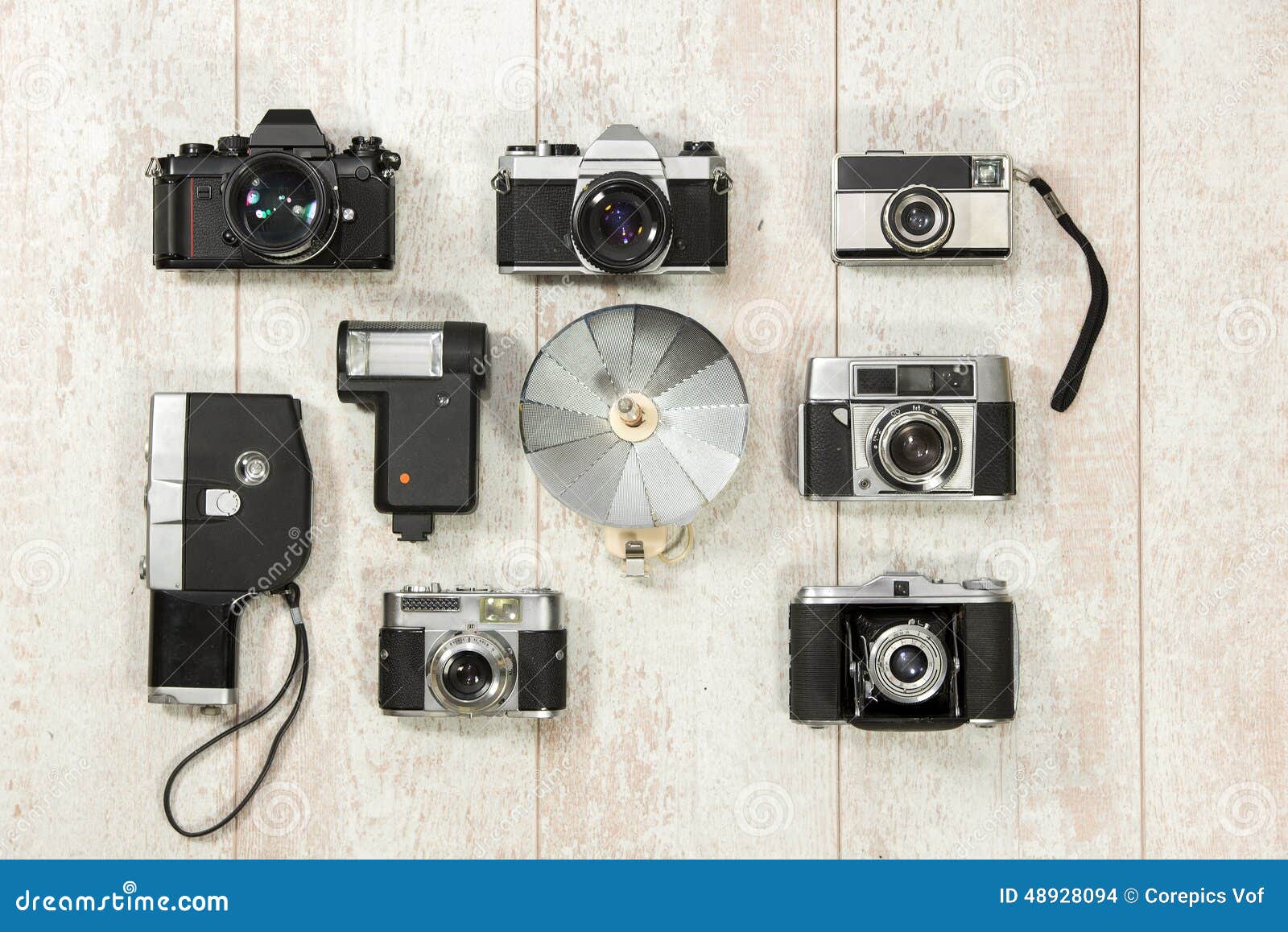 Vintage Cameras with Flash on Floorboard Stock Photo - Image of dish ...