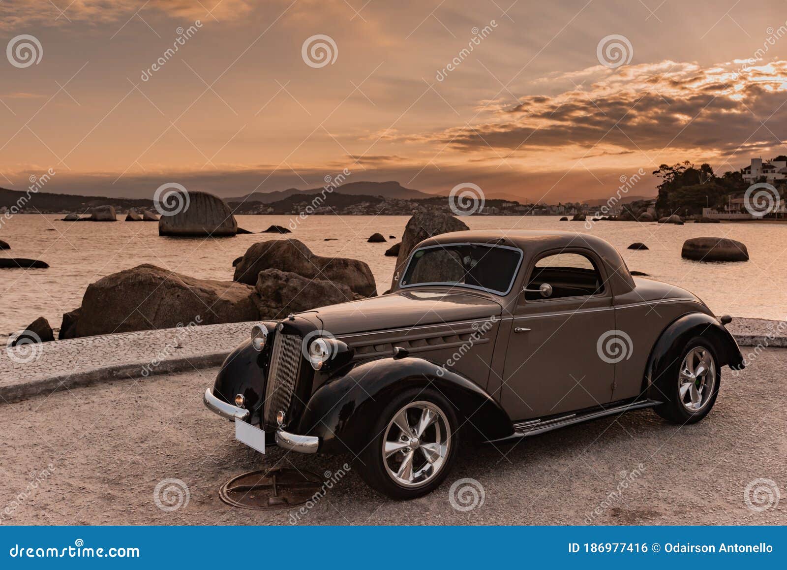 Vintage car 1951 at sunset stock photo. Image of auto - 186977416