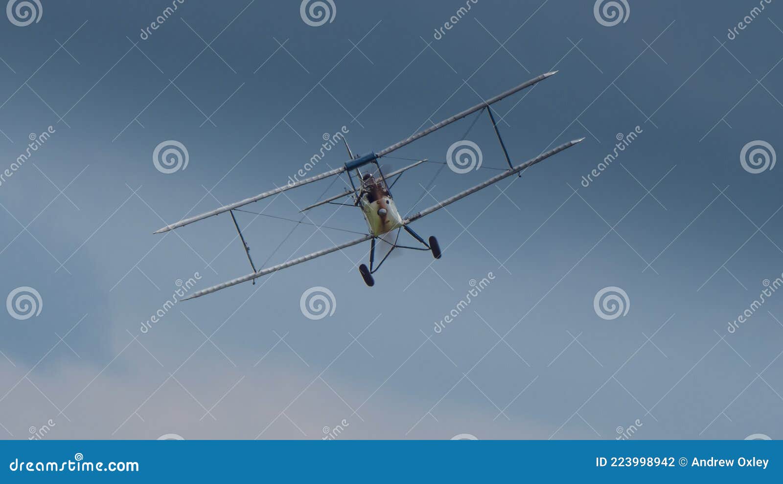 A Vintage Classic Biplane Aircraft in Flight Stock Photo - Image of ...