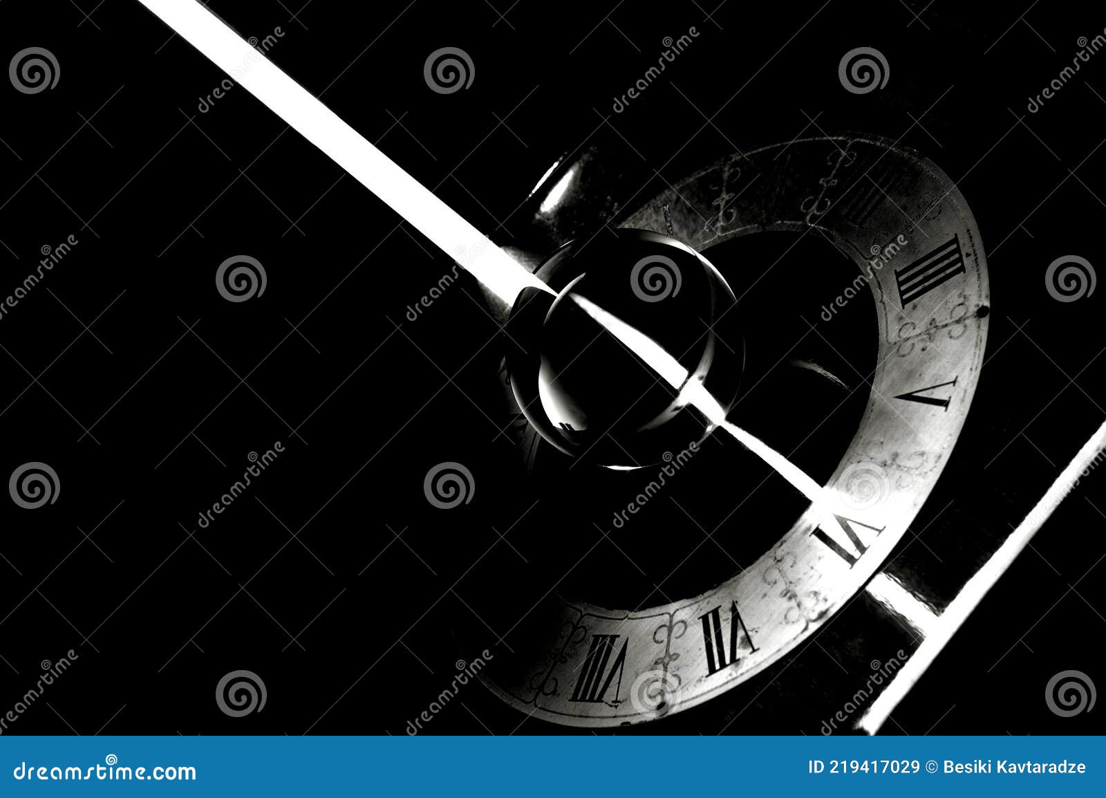 A Vintage Clock with a Bright Ray of Light Stock Image - Image of ...