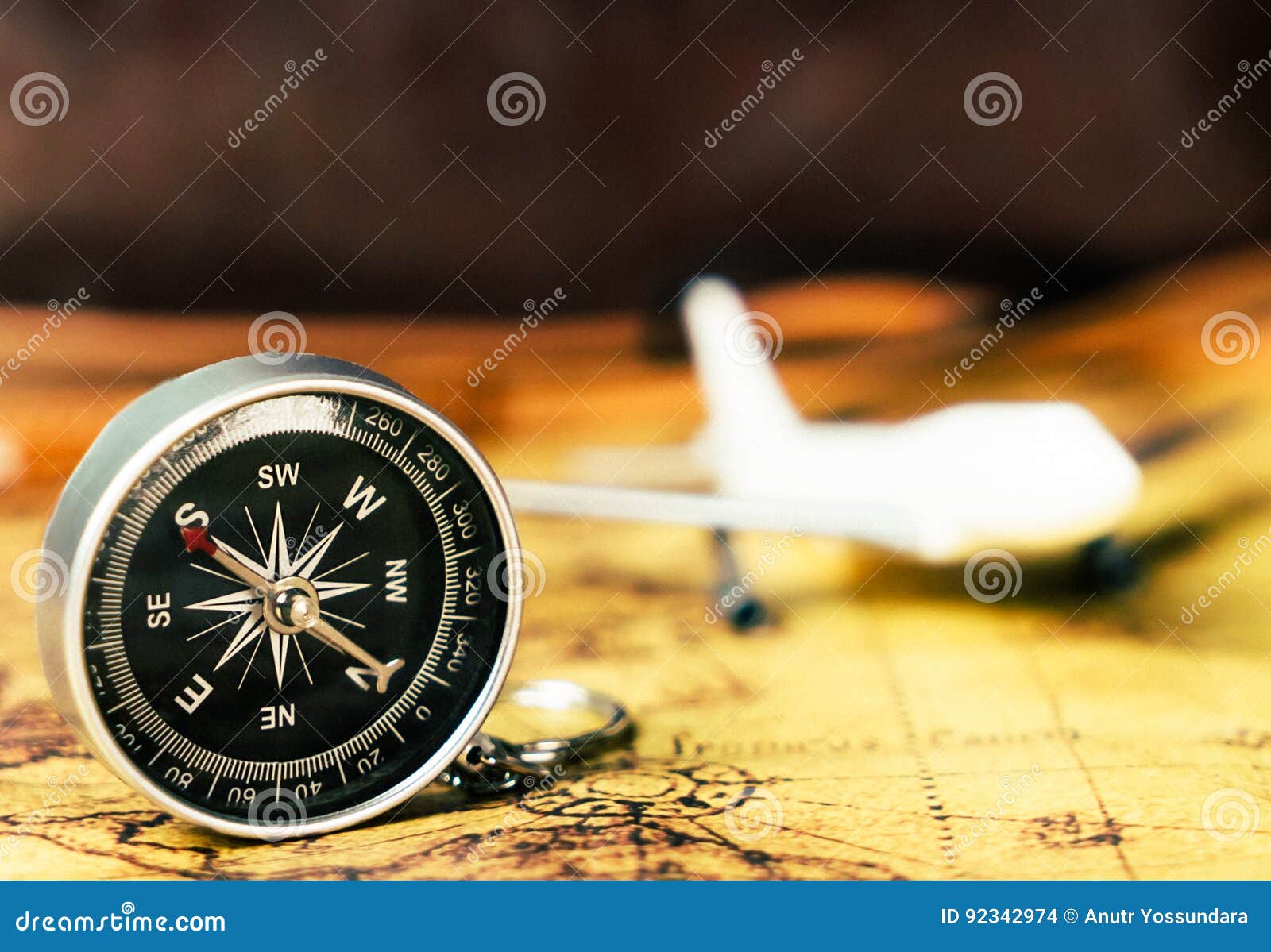 Vintage Compass Direction with Plane on Antique Map Stock Photo - Image ...