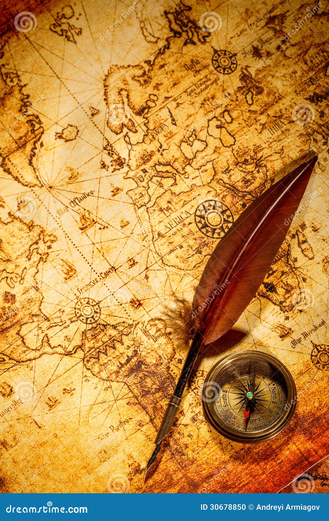 Vintage Compass and Goose Quill Pen Lying on an Old Map. Stock Photo ...