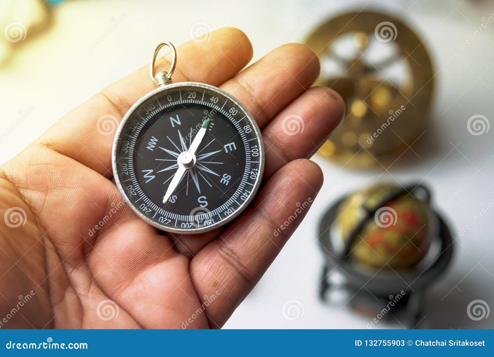 Vintage compass in hand stock image. Image of holding - 132755903