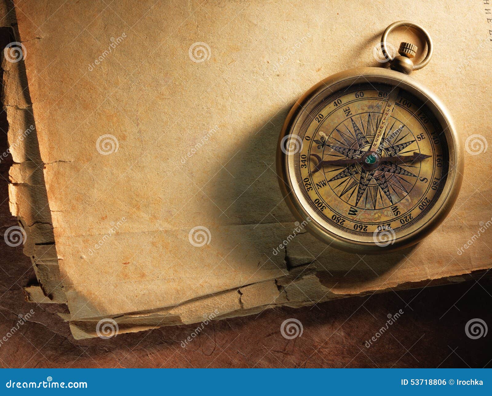 Vintage Compass on Old Paper Stock Photo - Image of discovery, location ...