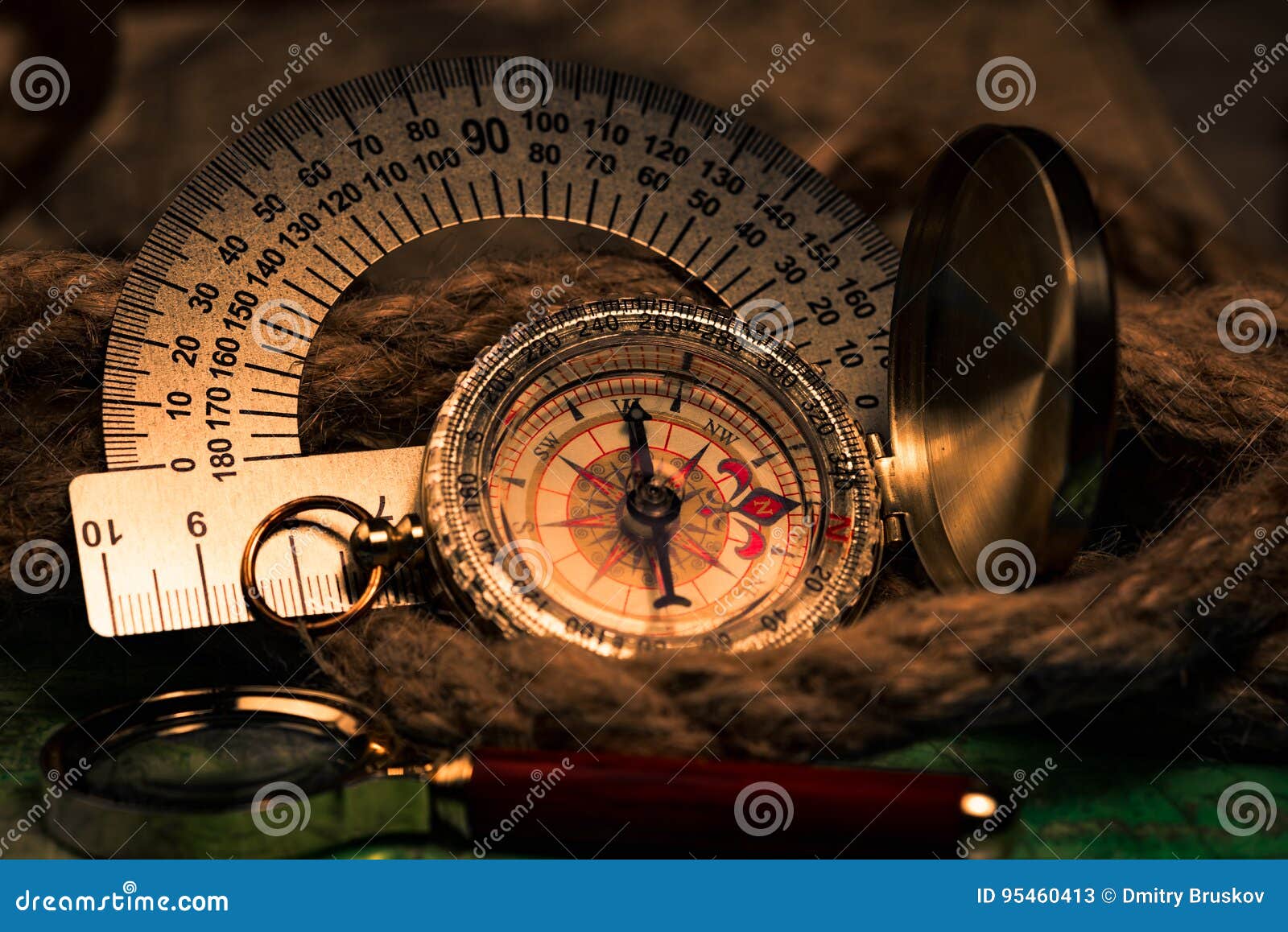 Vintage compass with rope stock image. Image of page - 95460413