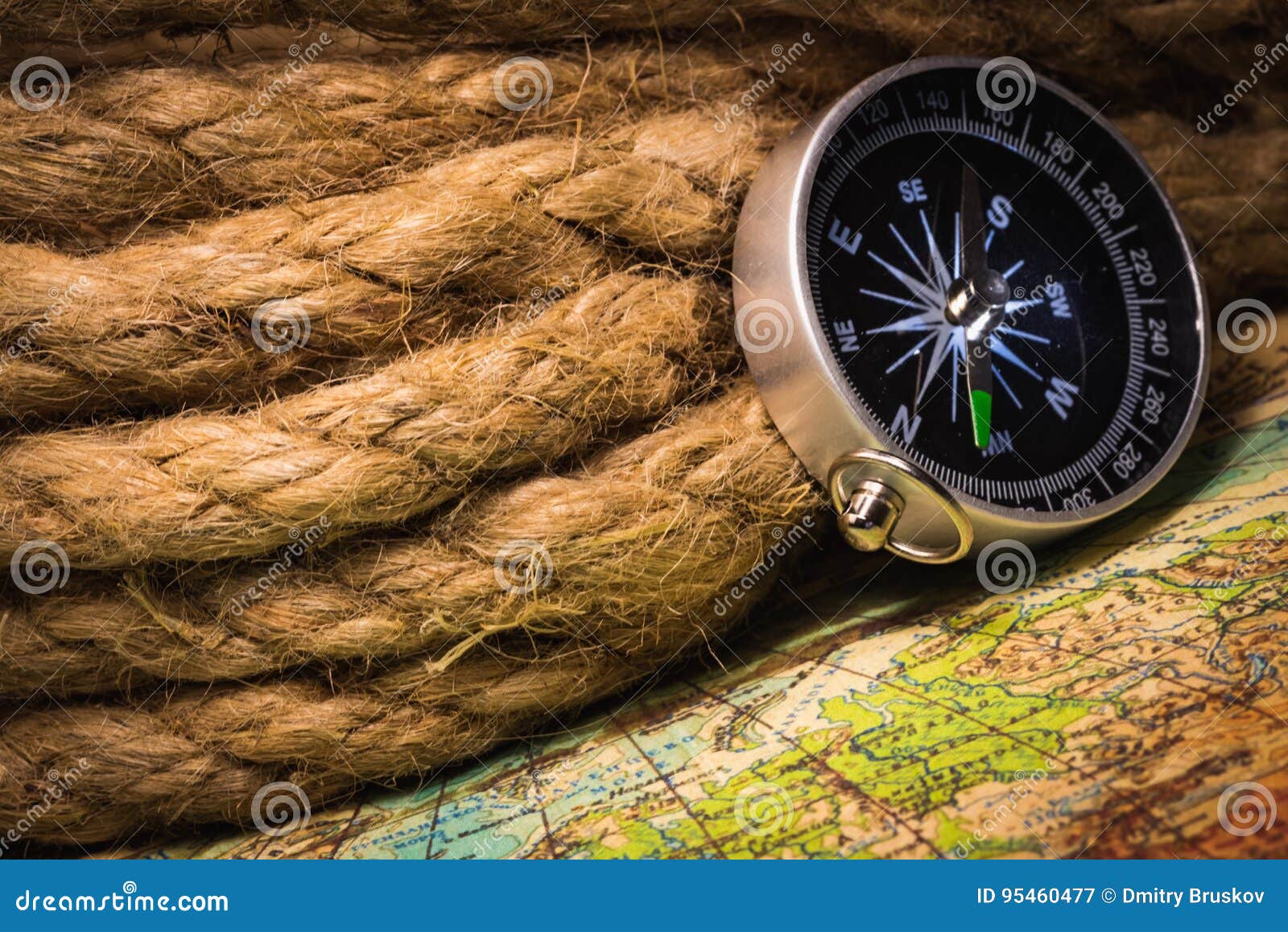 Vintage compass with rope stock image. Image of object - 95460477