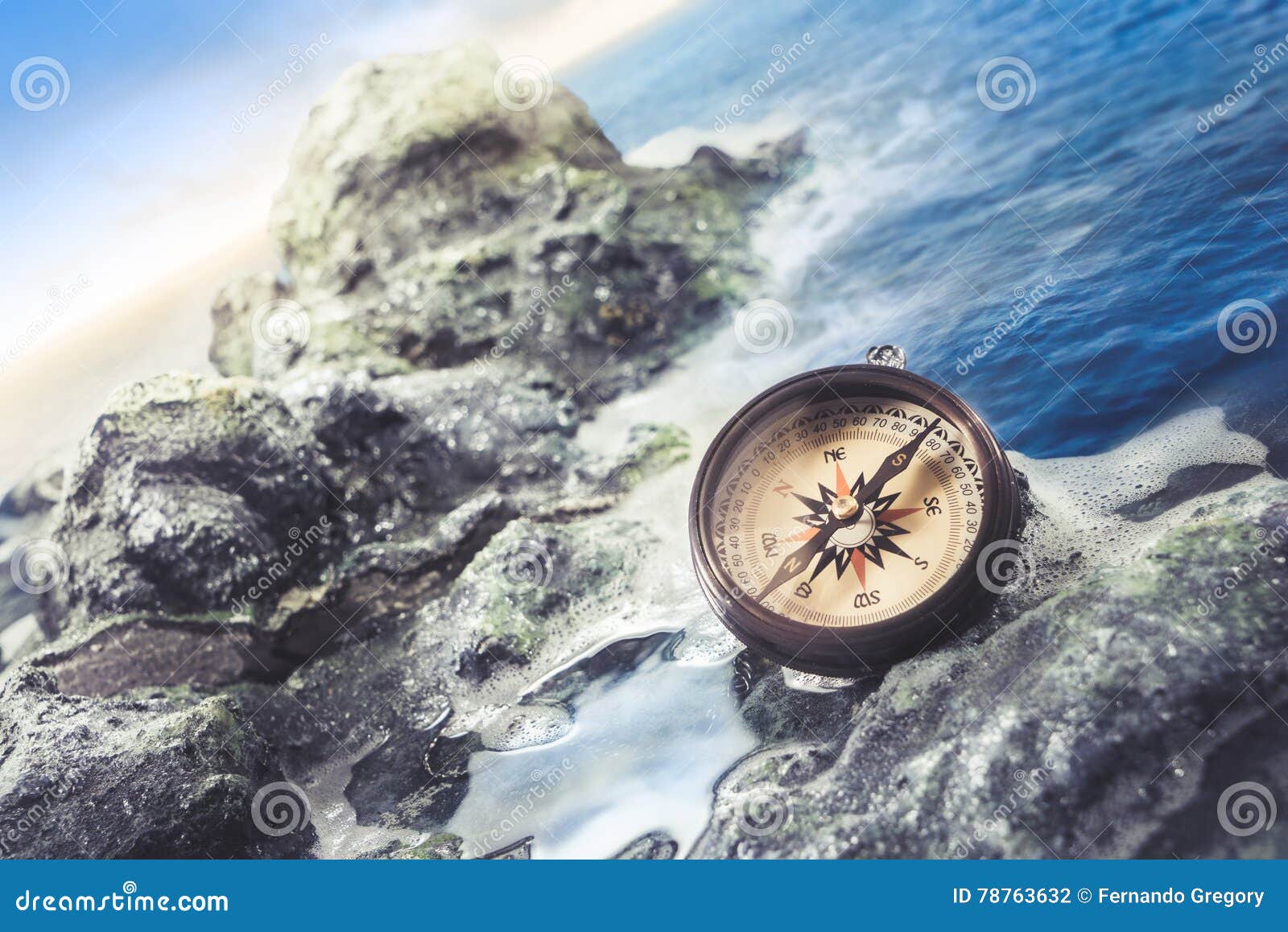 Vintage Compass on the Sea Shore Stock Photo - Image of ocean ...