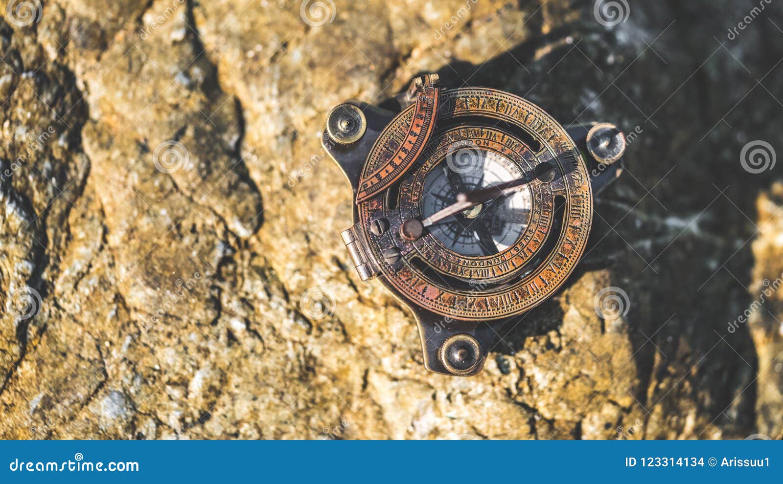 Vintage Compass on Stone Rock Stock Photo - Image of paleontology ...