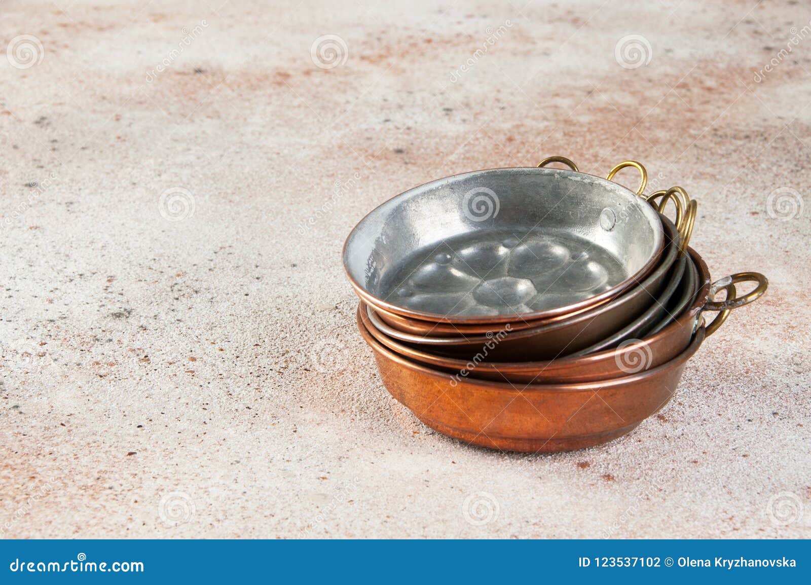 Vintage Copper Molds on a Concrete Background. Stock Photo - Image of ...