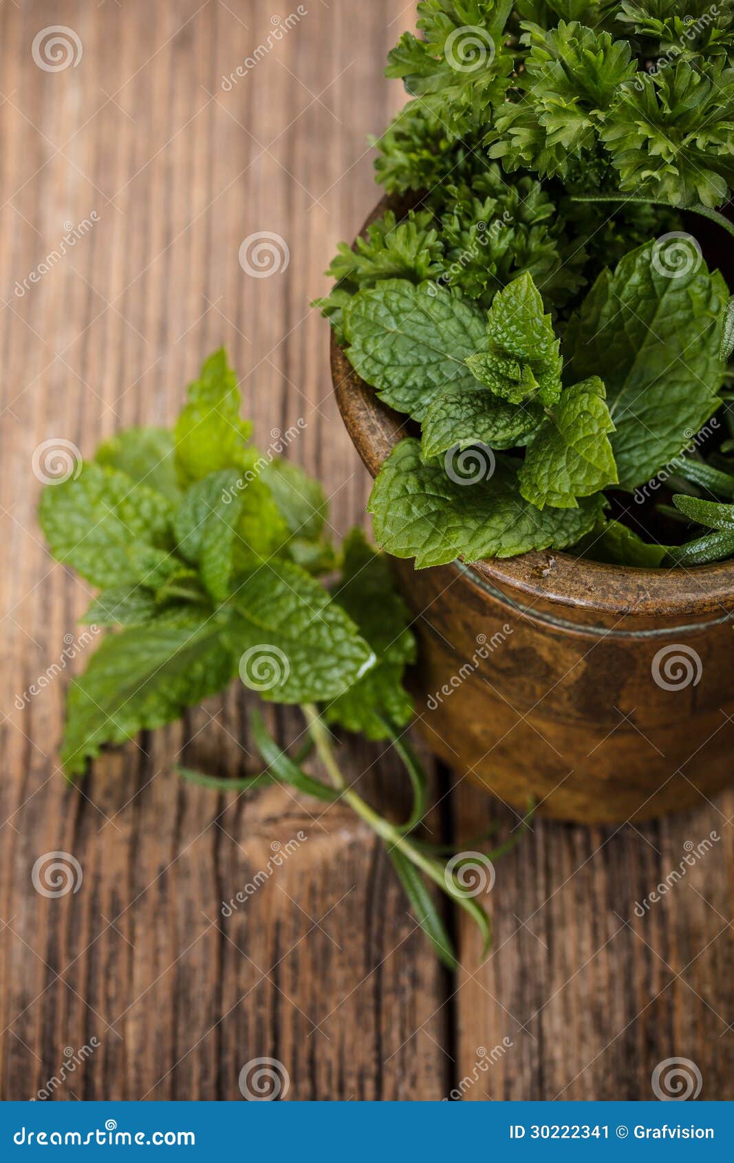 Copper mortar with herbs stock image. Image of grind - 30222341