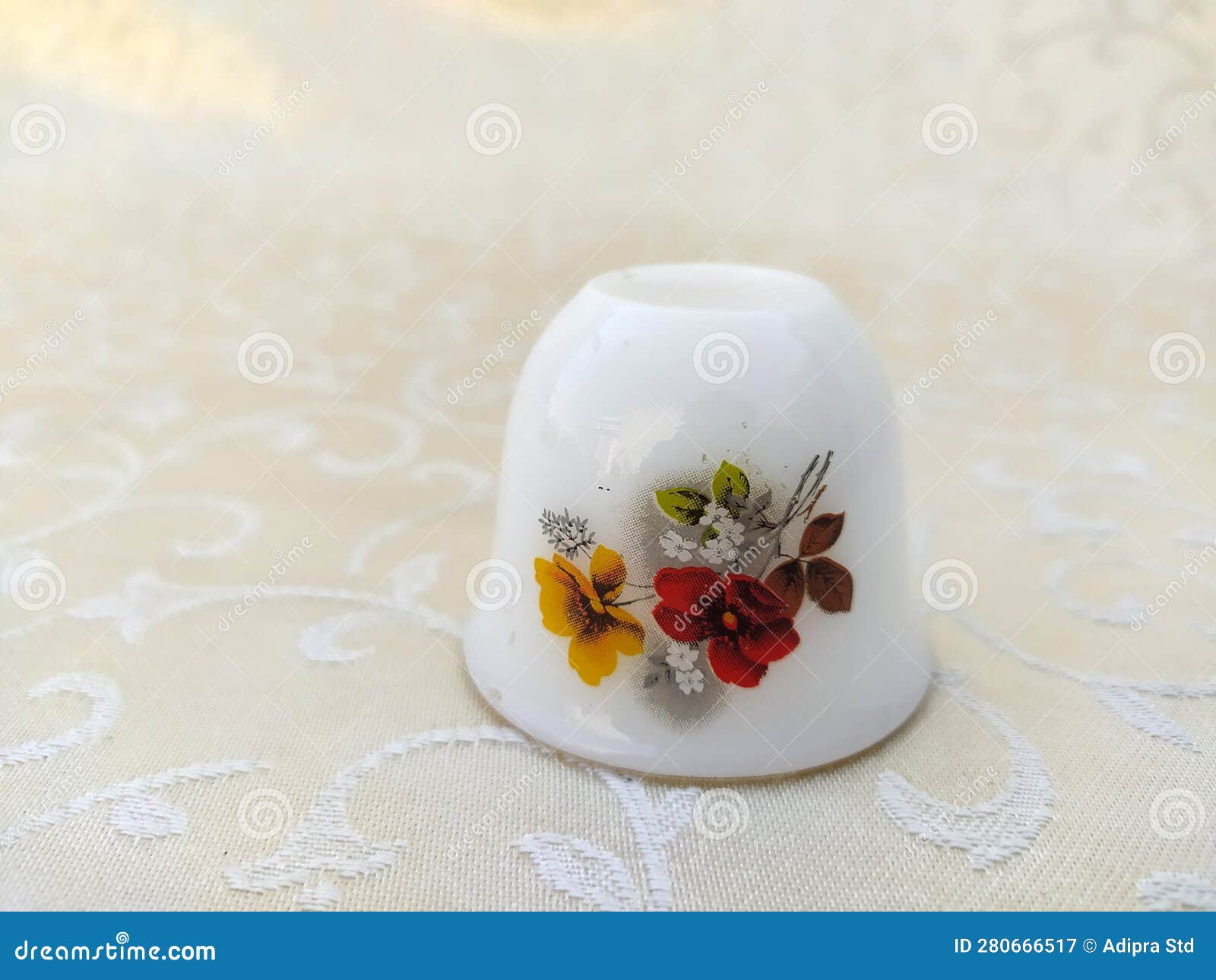 Vintage Cups with Floral Textures are Uniquely Arranged on the Table ...