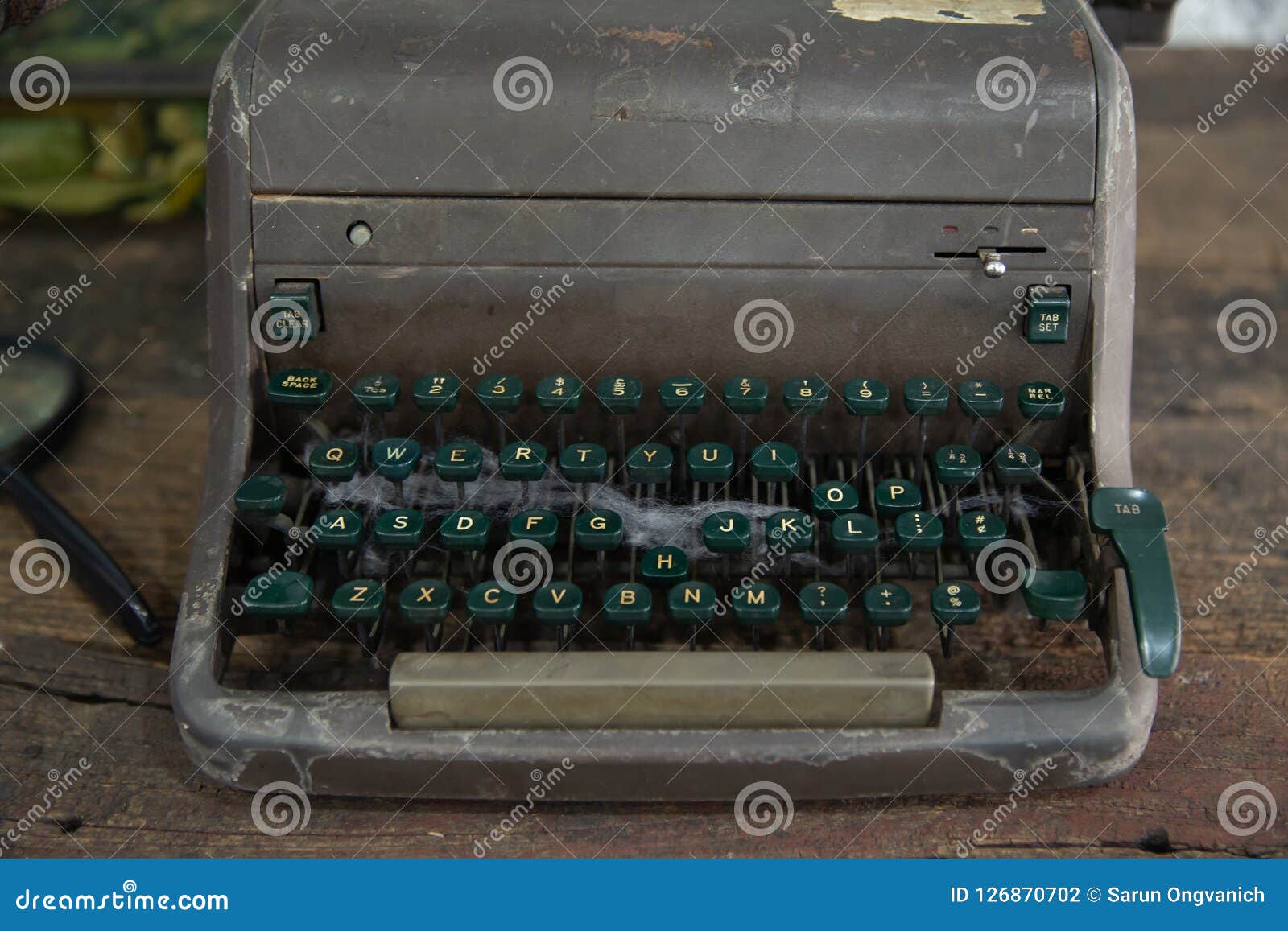 Close Up of Vintage Damaged Typewriter on Wooden Table. Stock Photo ...
