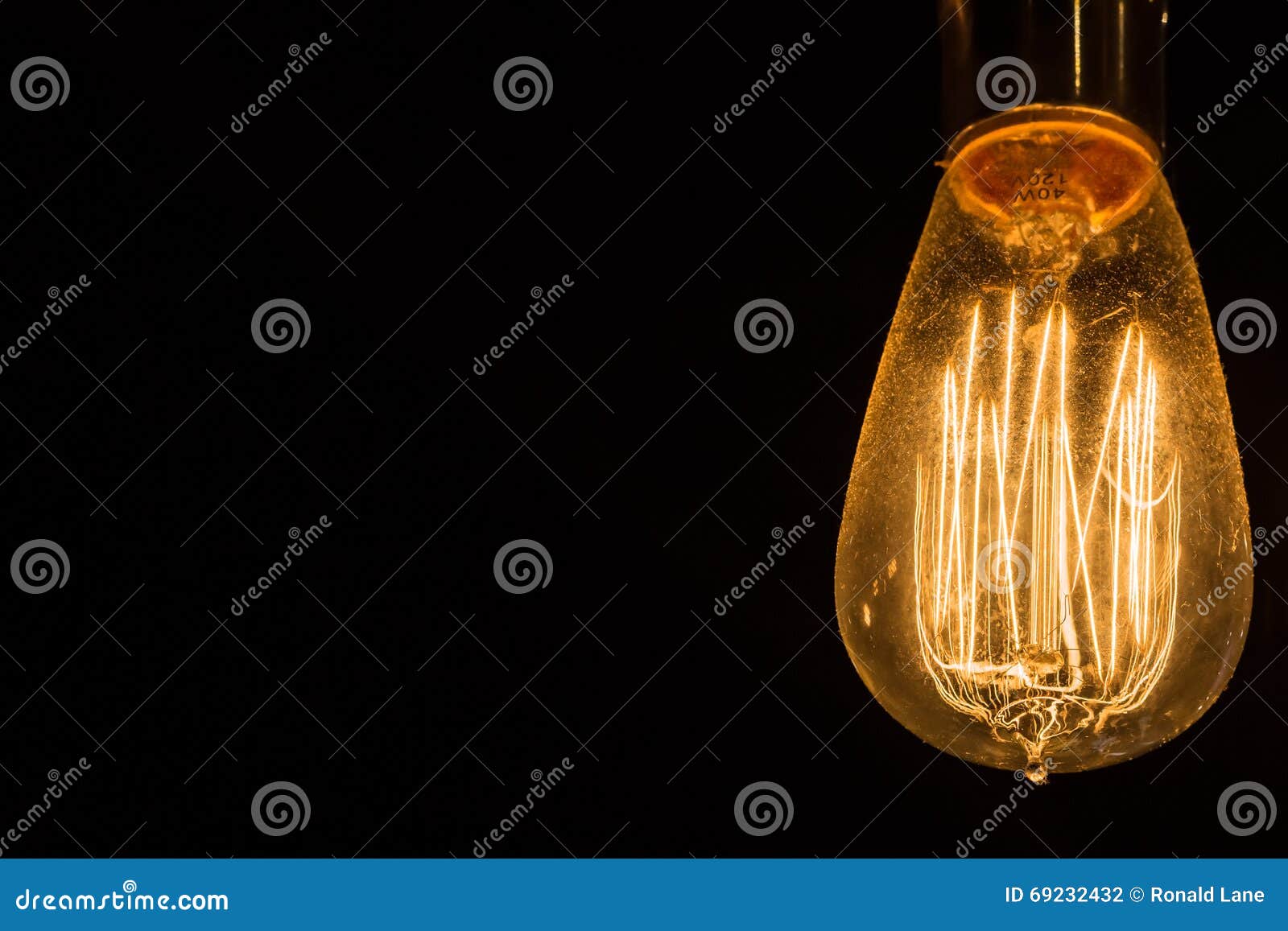 Vintage Edison Light Bulbs Hanging Against a Black Background Stock ...