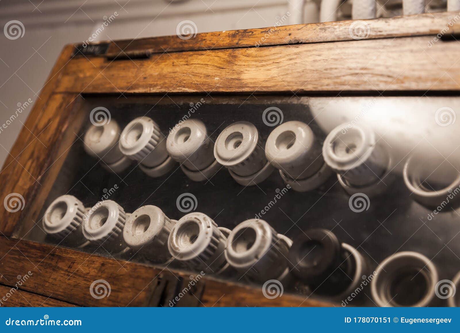 Vintage Electrical Fuses Mounted on a Dark Panel Stock Image - Image of ...