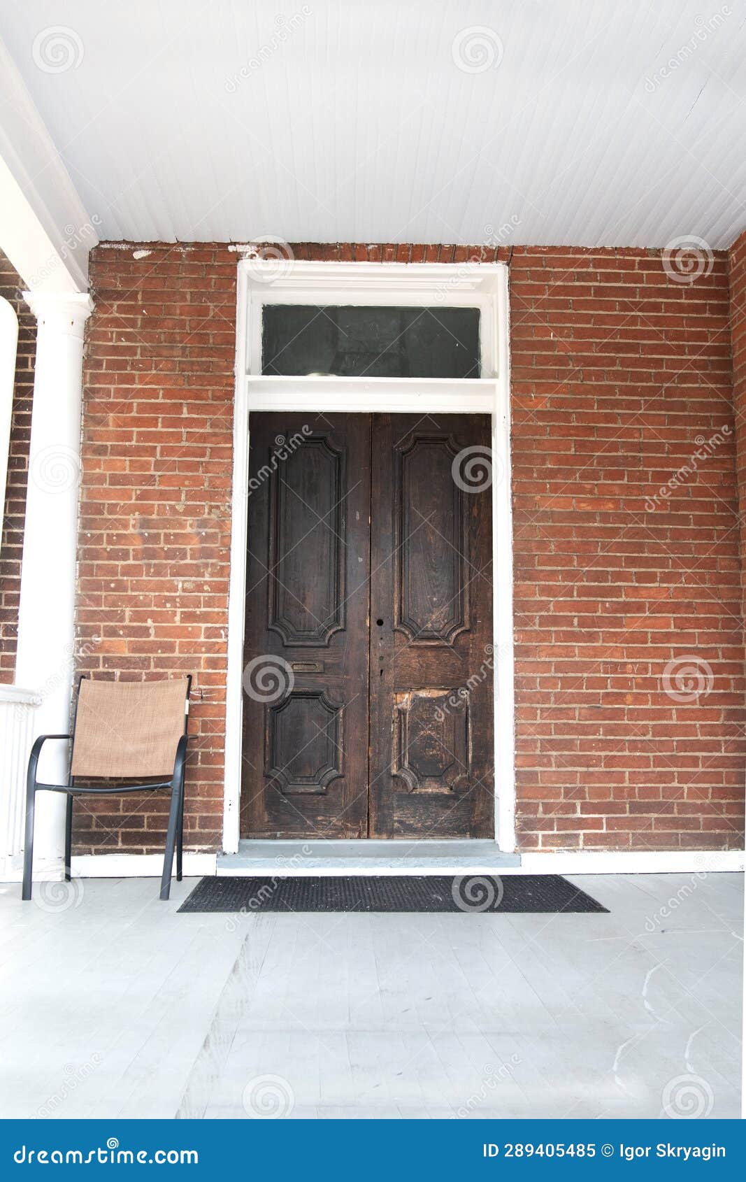 Vintage Front Door To a Brick House with a Canopy Stock Image - Image ...