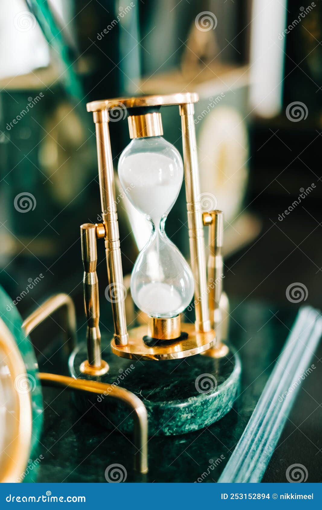 Golden Hourglass On Dark Brown Background. Hour Glass Is Also Known As ...