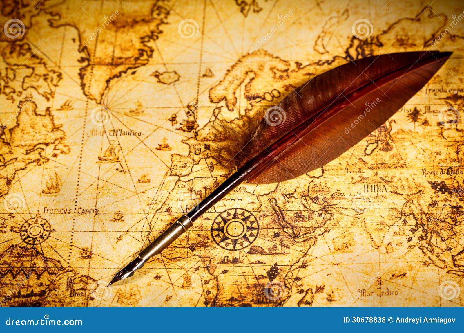 Vintage Goose Quill Pen Lying on an Old Map. Stock Photo - Image of ...