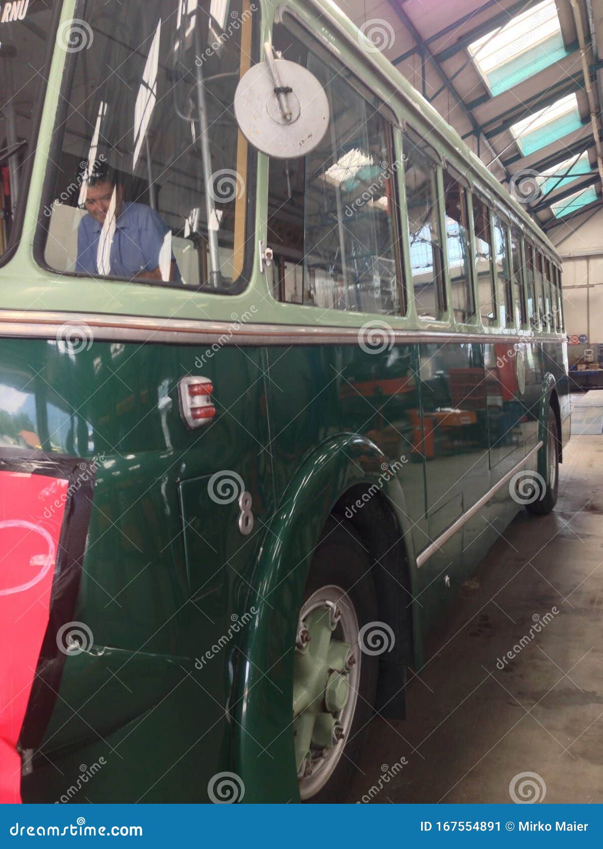 Vintage Green Bus in the Garage Editorial Photo - Image of passenger ...
