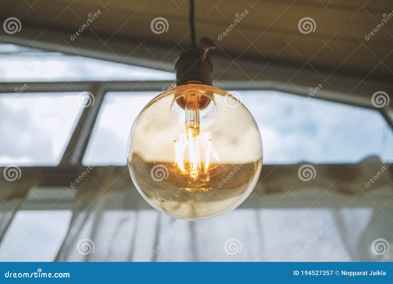 Vintage Incandescent Edison Type Bulb in Home Stock Image - Image of ...