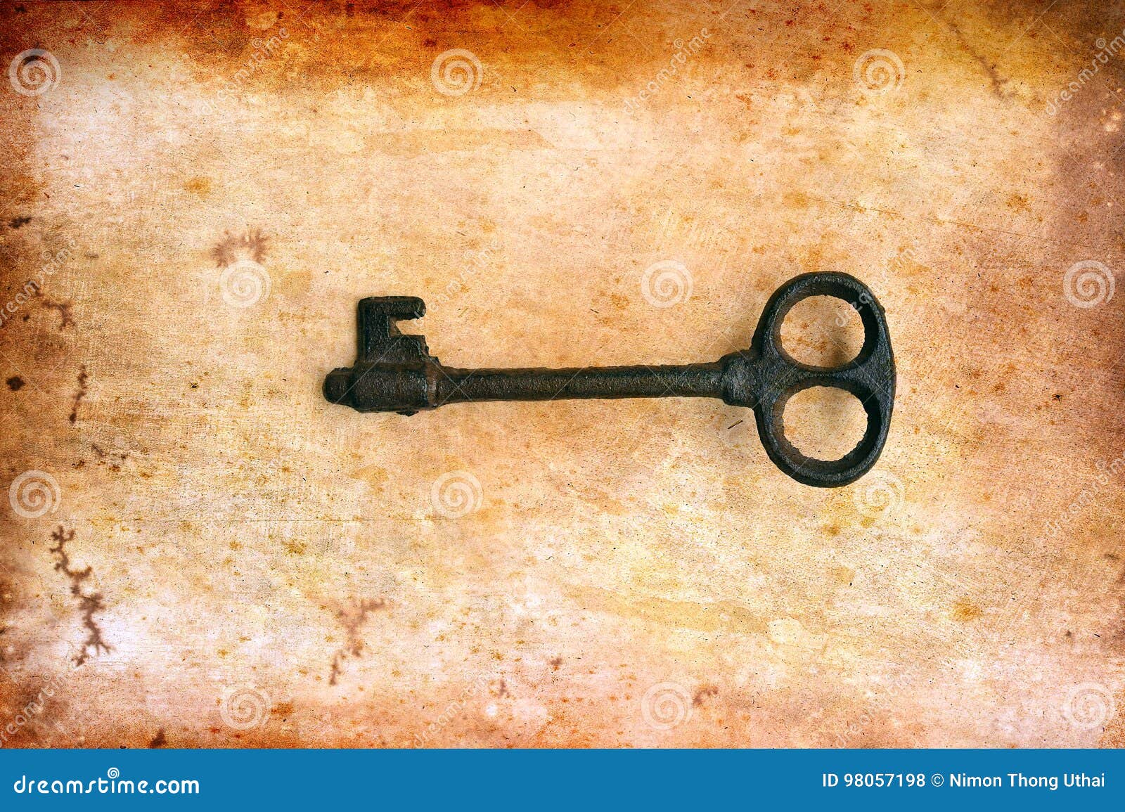 Vintage key on old paper stock photo. Image of bronze - 98057198