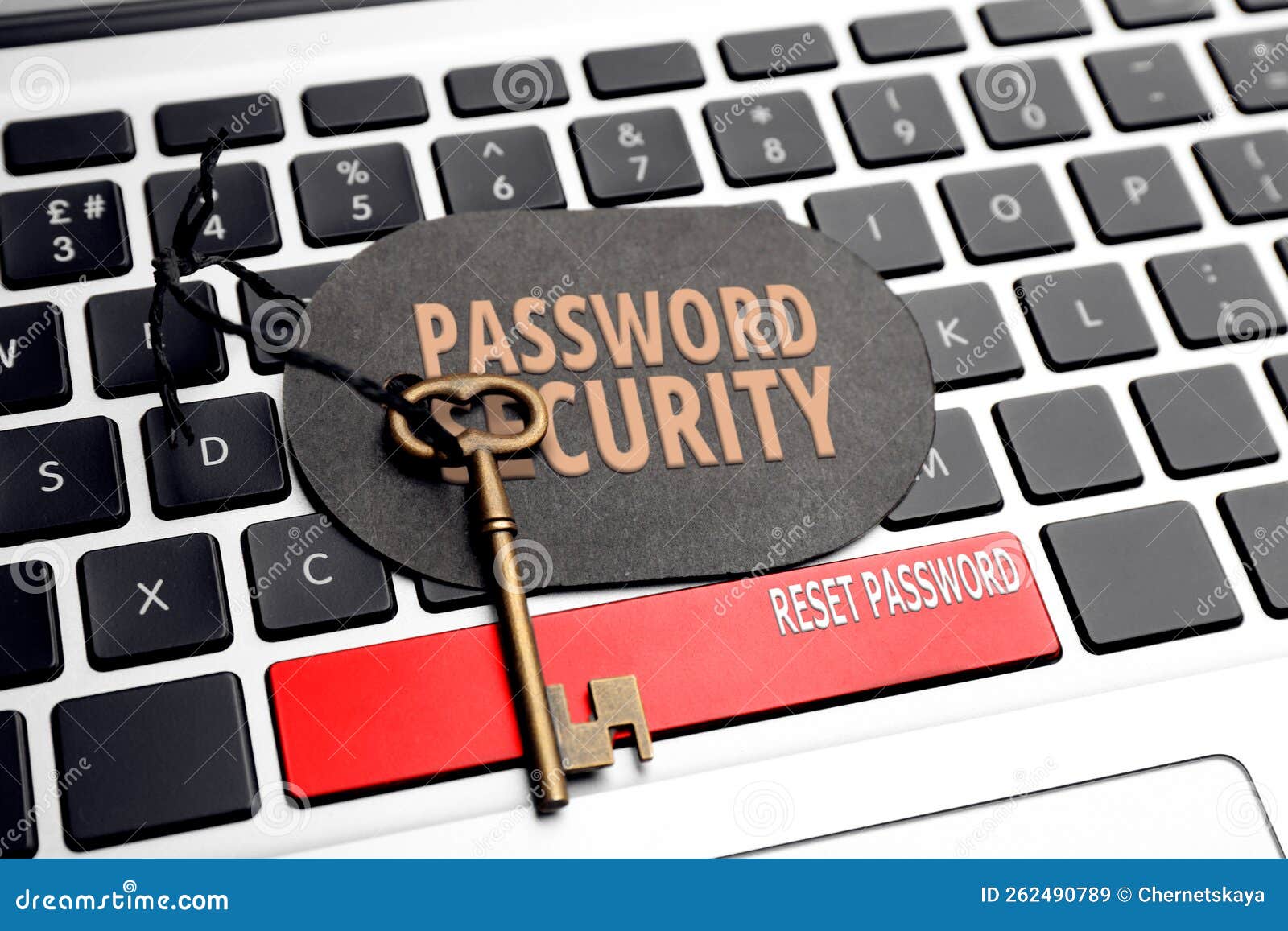 Vintage Key with Tag on Laptop, Closeup. Password Security Concept ...