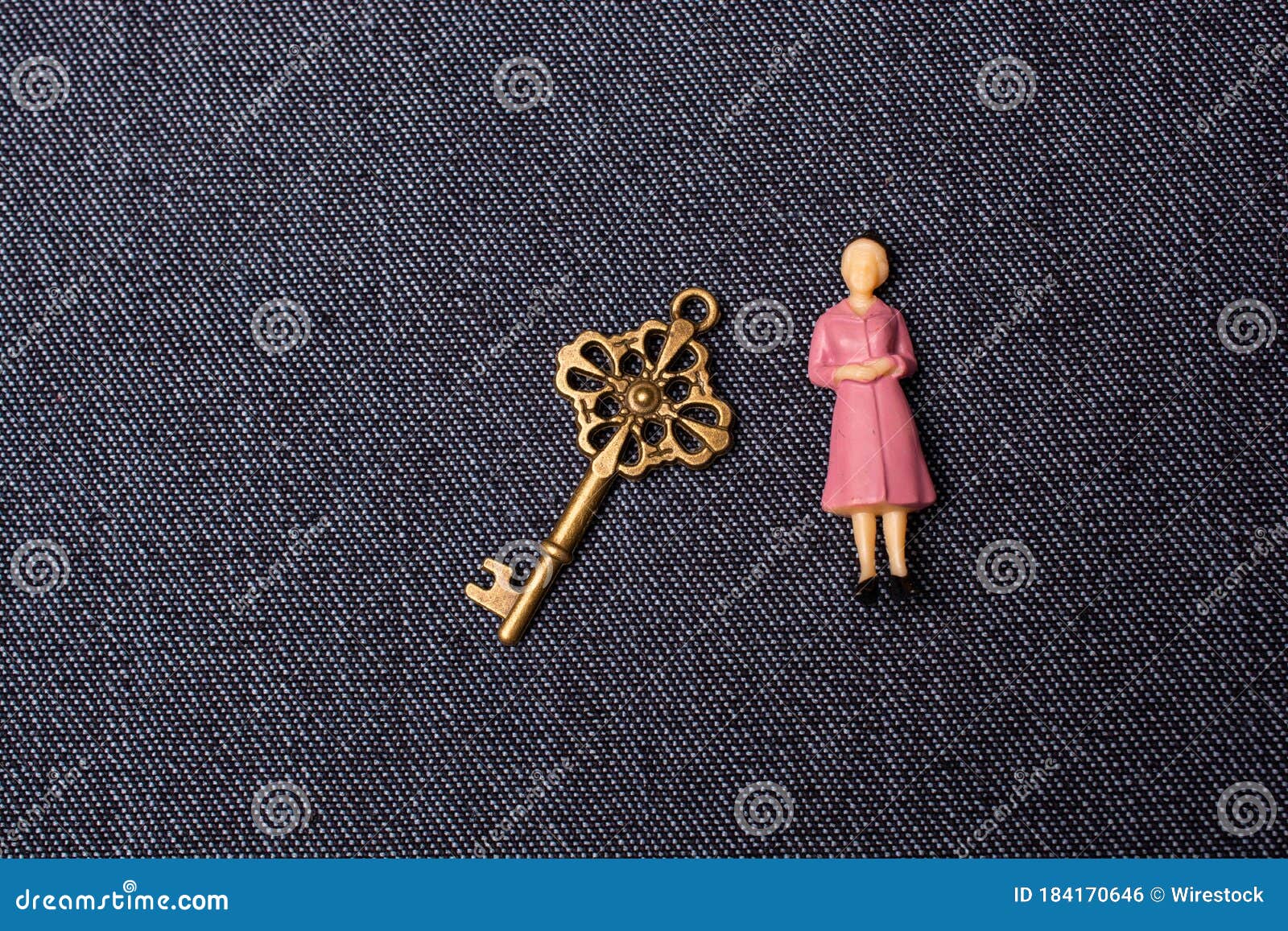 Vintage Key and a Toy Figure on the Fabric Stock Photo - Image of ...