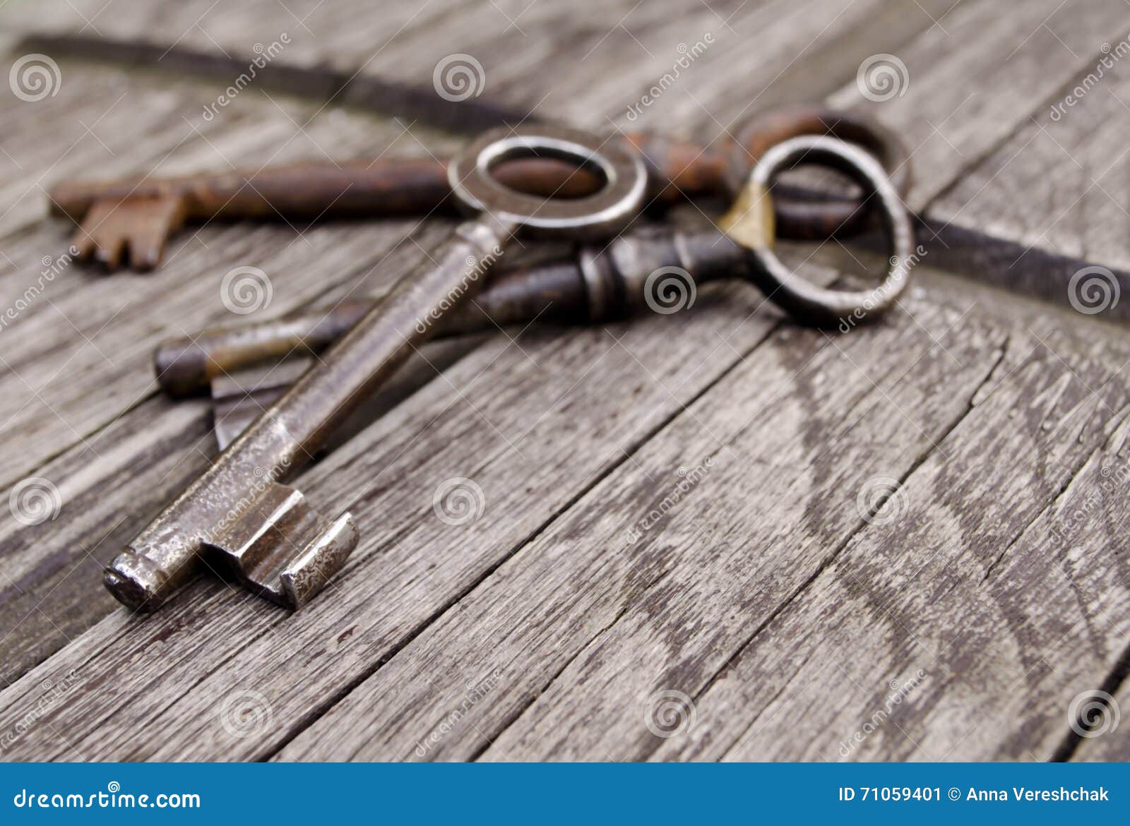 Vintage Keys on Old Wooden Background. Close-up Stock Image - Image of ...