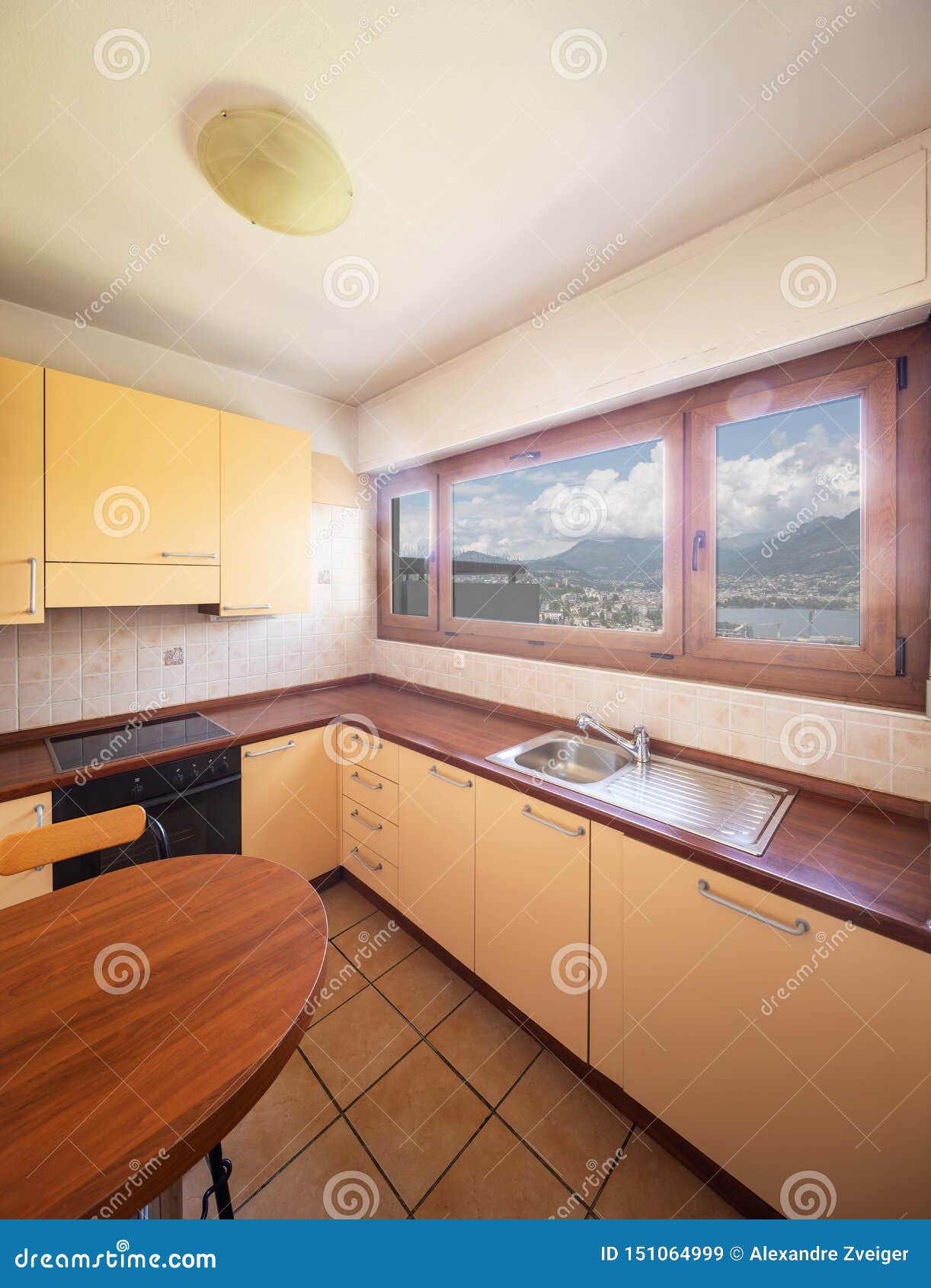 Vintage Kitchen with Window and Table with Stools Stock Image - Image ...