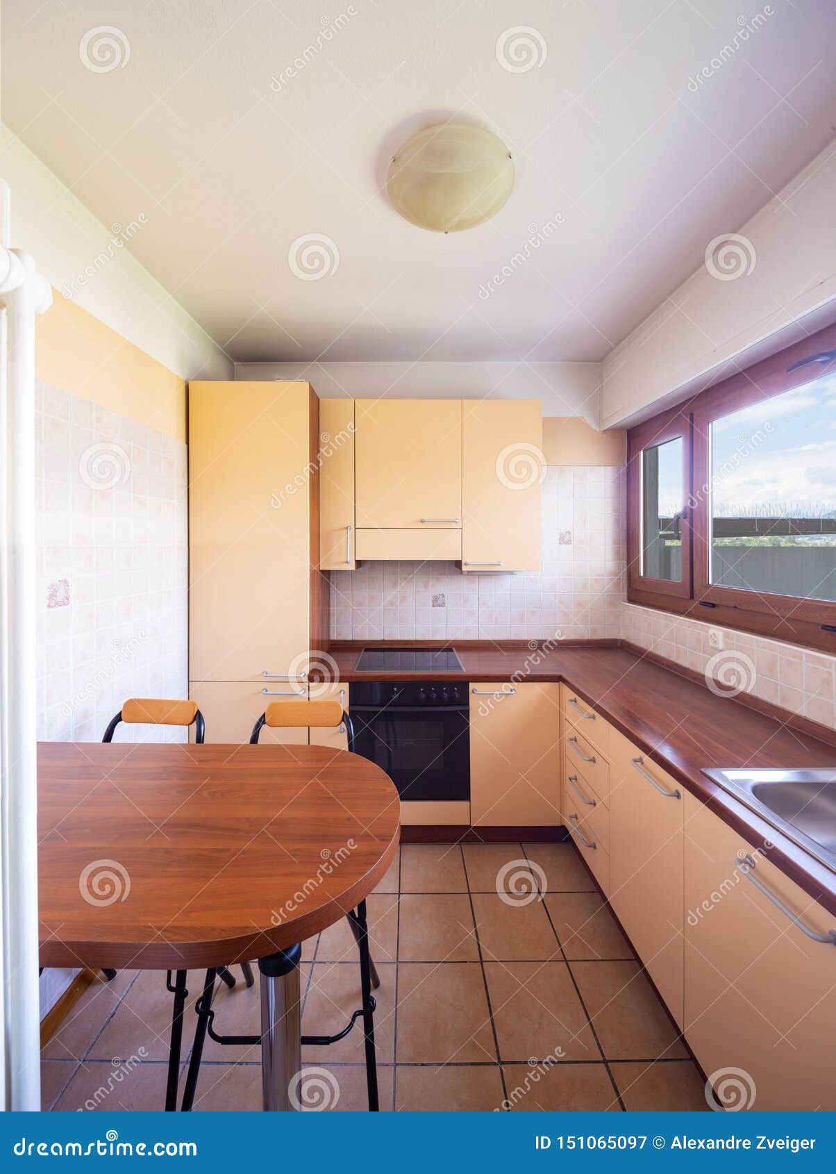 Vintage Kitchen with Window and Table with Stools Stock Image - Image ...
