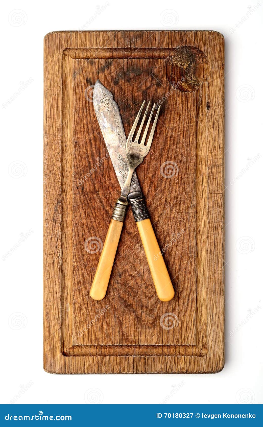 Vintage Knife and Fork on a Cutting Board on a White Background Stock ...