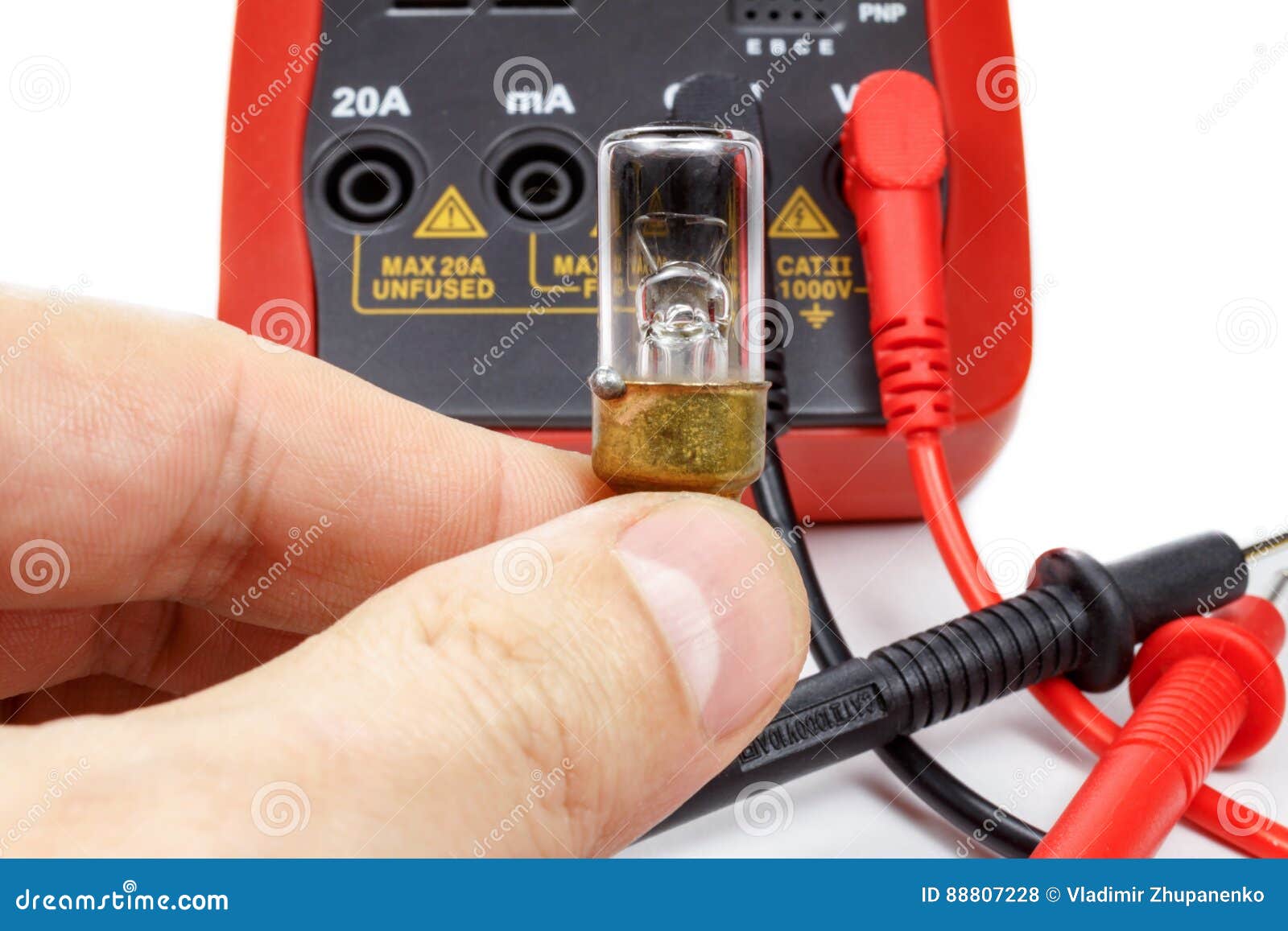 Vintage Light Bulb in the Hand of the Engineer on White Background ...